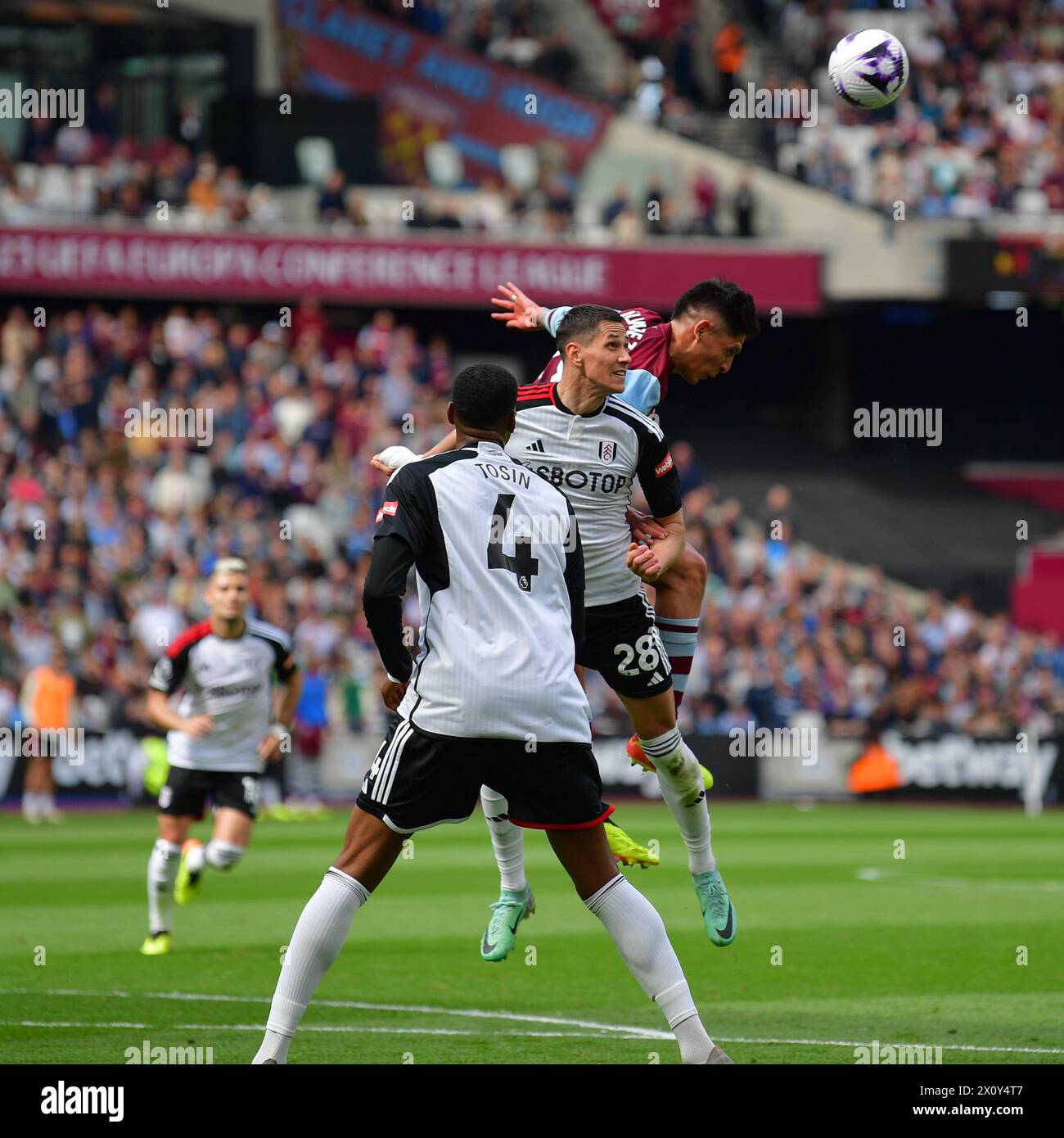 London, England on 14 April 2024. Sasa Lukic of Fulham FC and Edson ...