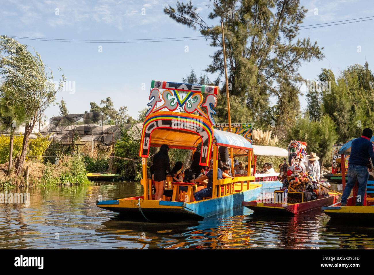 Tourists enjoy a day on Xochimilco boat tours, which offers a variety ...