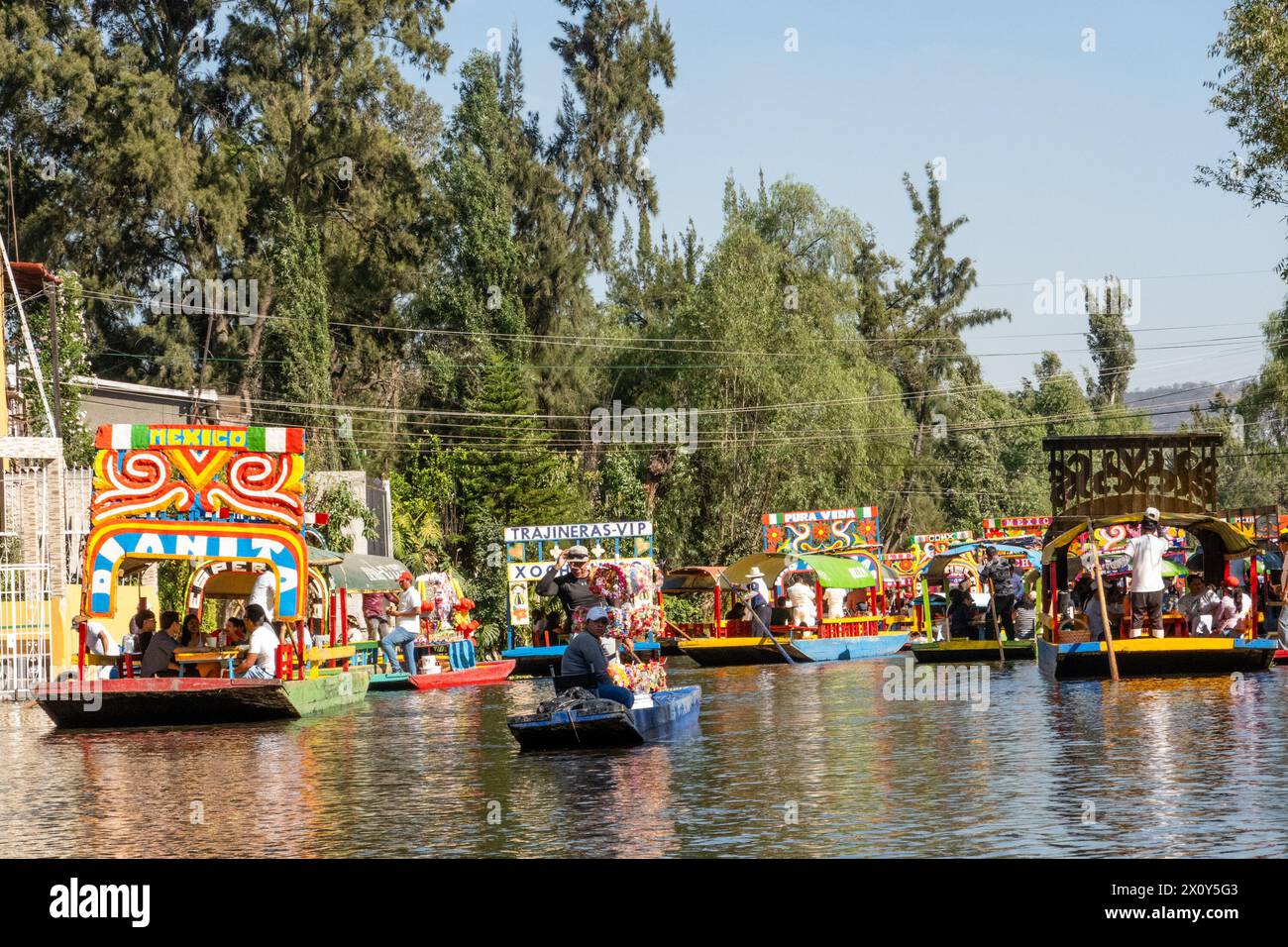 Tourists enjoy a day on Xochimilco boat tours, which offers a variety ...