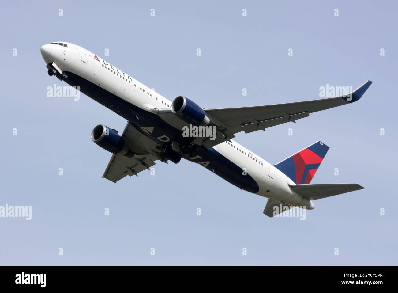 A Boeing 767-300 of Delta Air Lines departs London Gatwick Airport ...