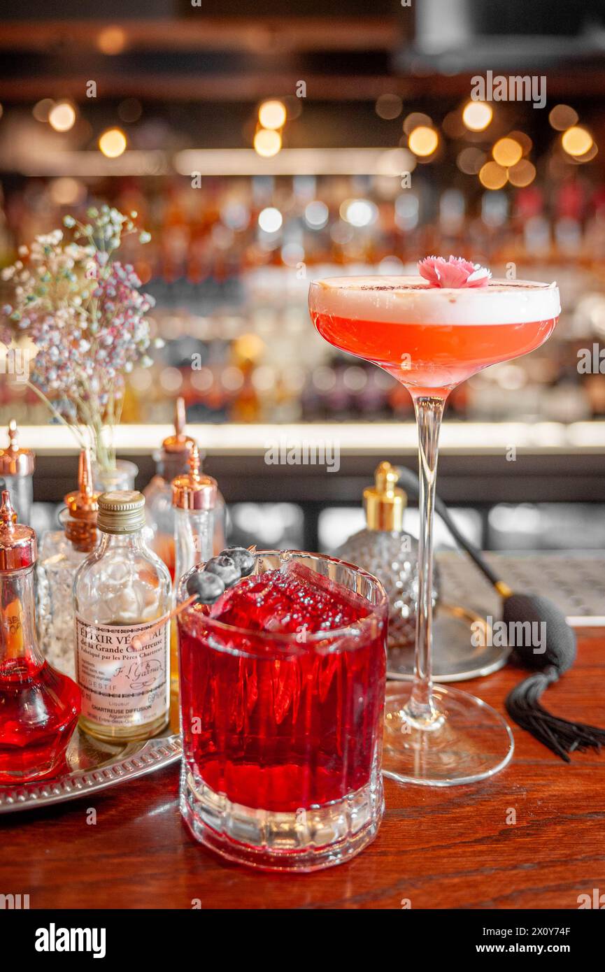 Two alcoholic cocktails on the bar counter Stock Photo - Alamy