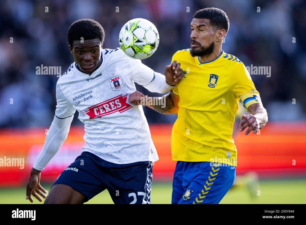 AGF's Michael Akoto in battle with Broendby's Ohi Omoijuanfo during the ...