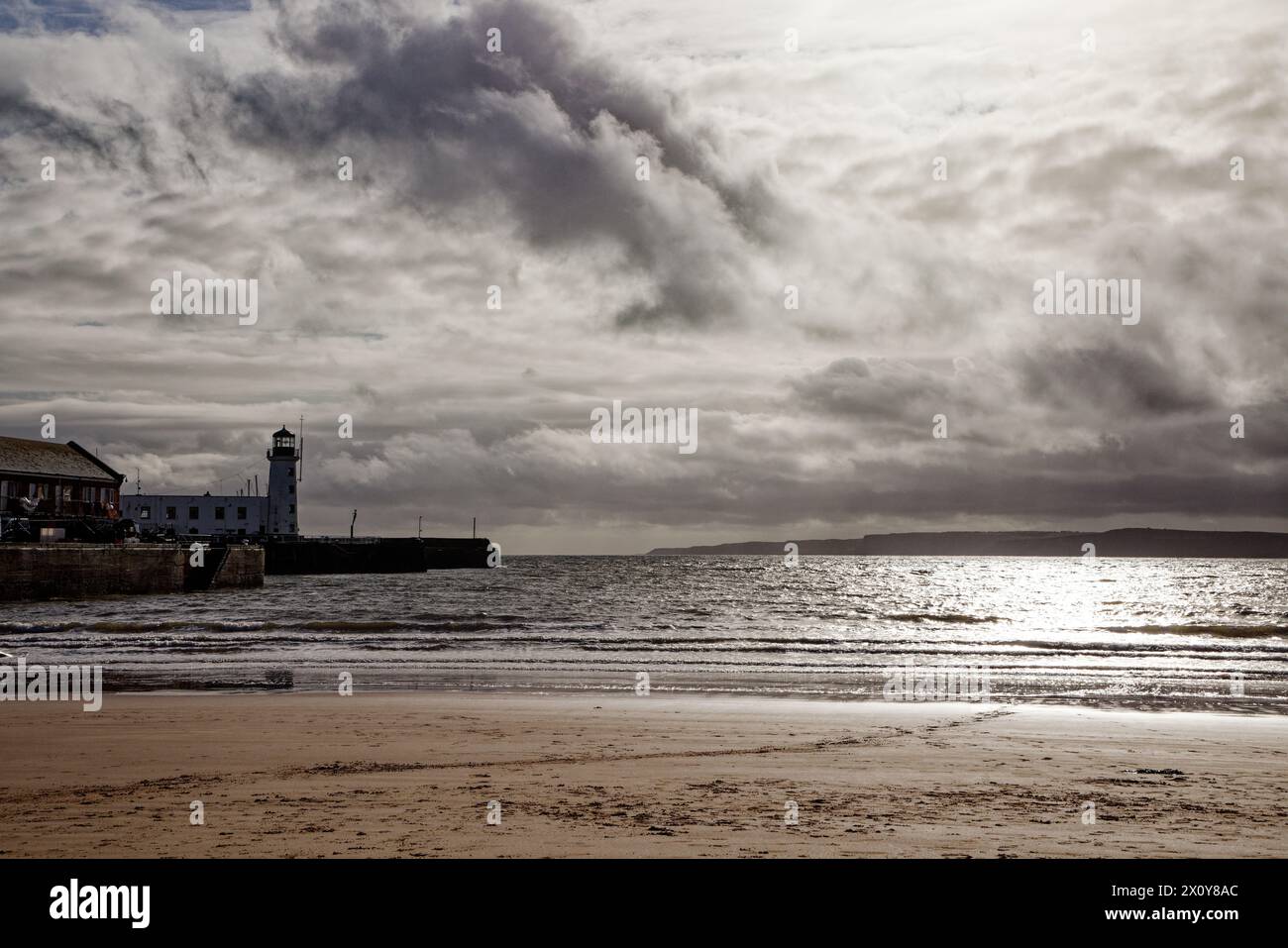 Moody skies over Scarborough Lighthouse, England Stock Photo - Alamy