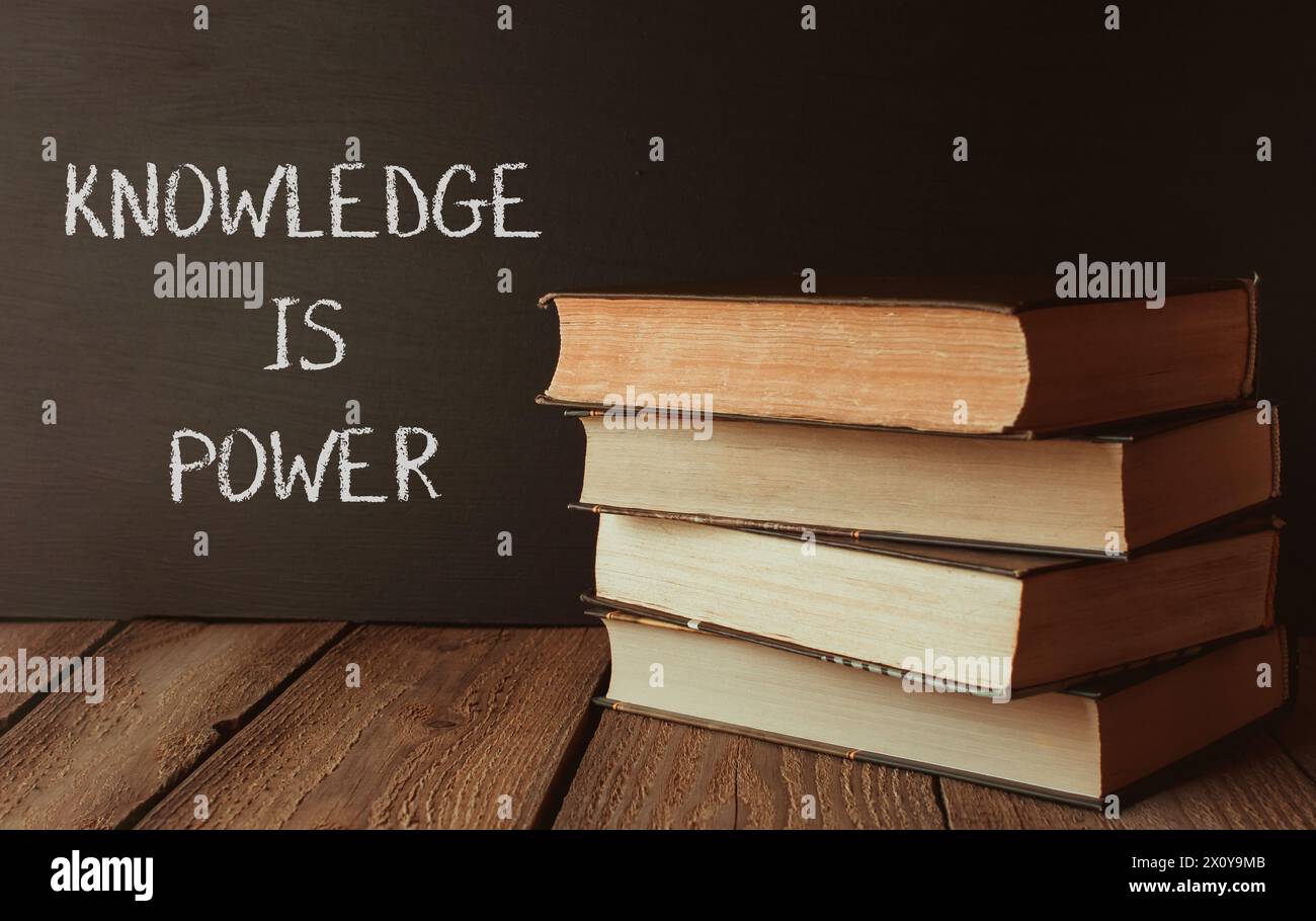 Knowledge is power. The books stacked on top of each other symbolize ...