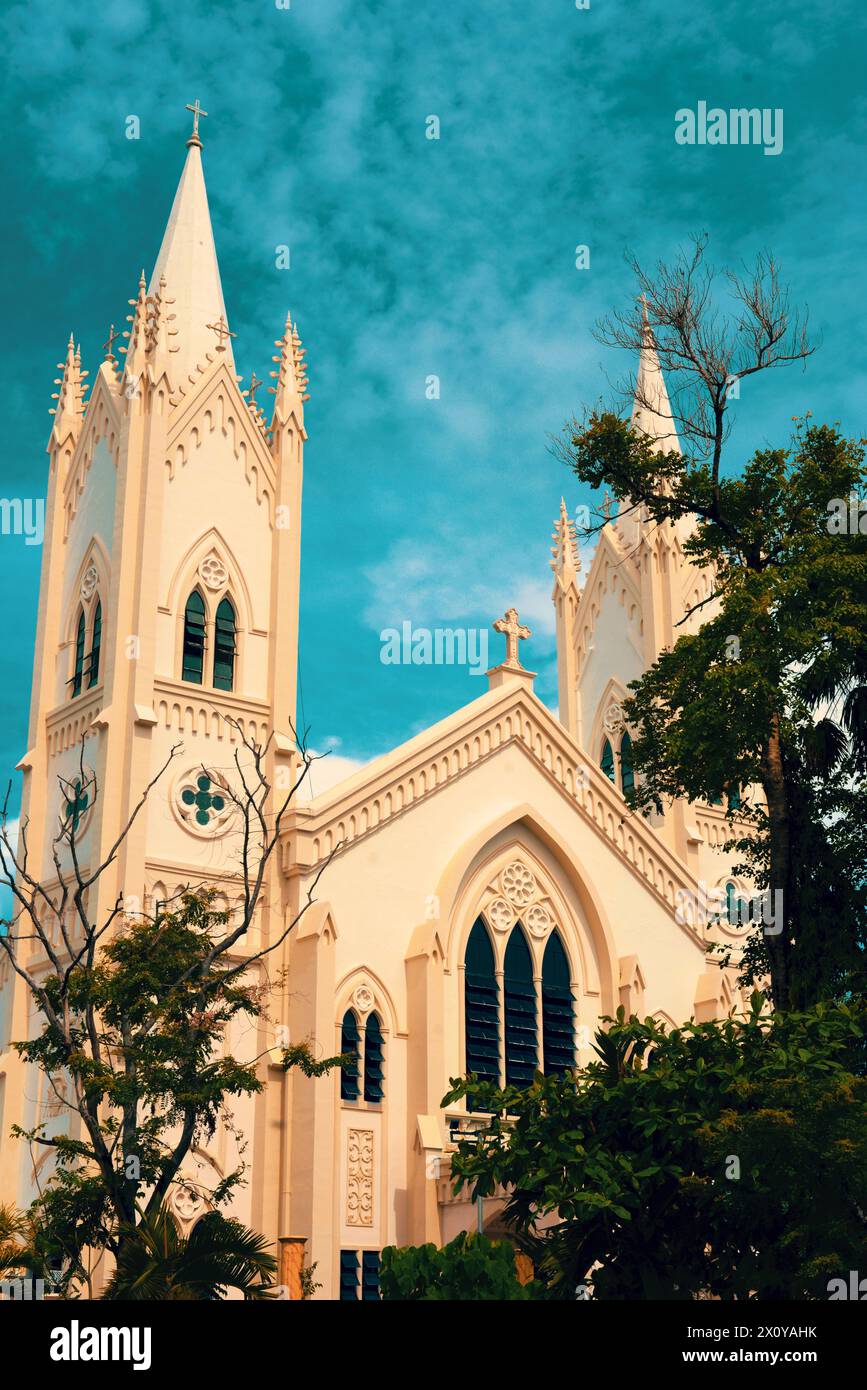 A stunning historical church showcased against a vibrant blue sky, its ...