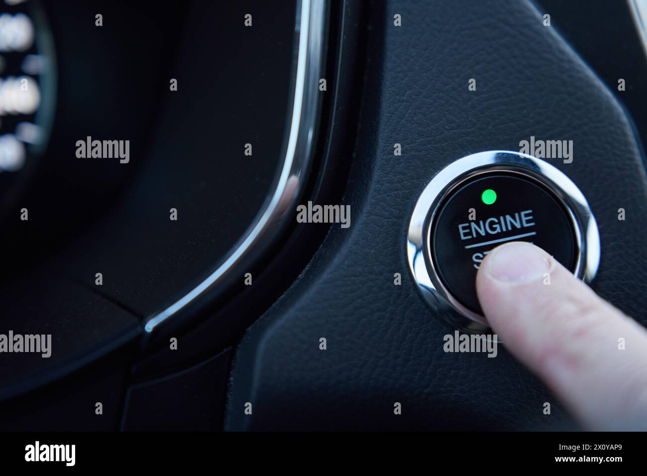 Man presses the engine start button in a car. Starting car engine Stock ...