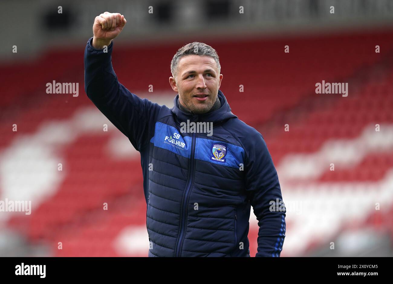 Warrington Wolves head coach Sam Burgess celebrates following the ...