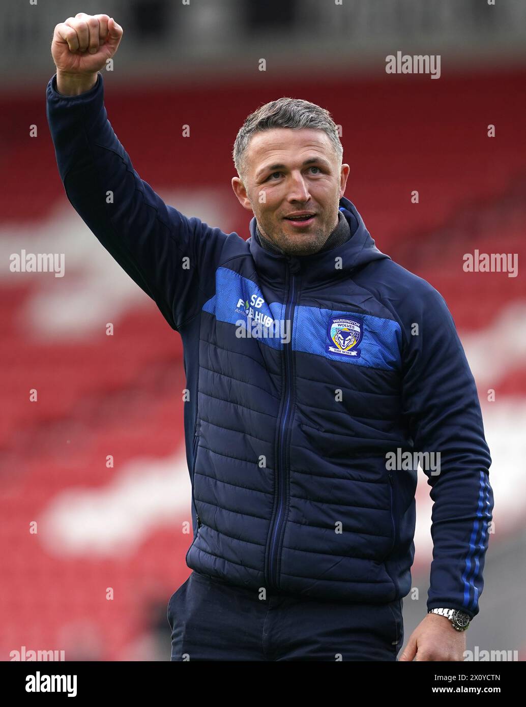Warrington Wolves head coach Sam Burgess celebrates following the ...