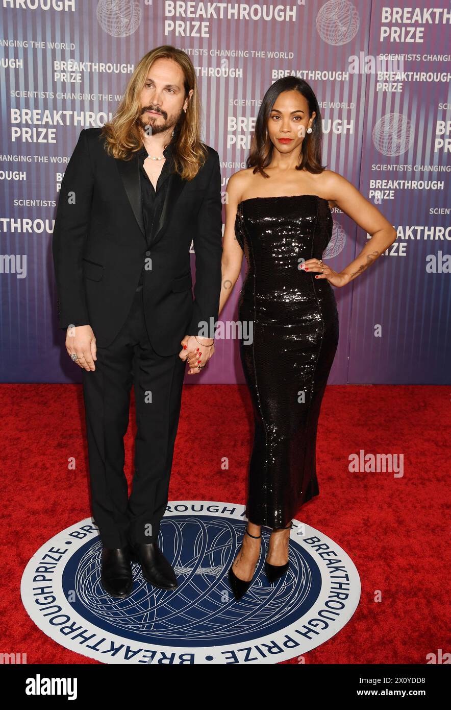 LOS ANGELES, CALIFORNIA - APRIL 13: (L-R) Marco Perego and Zoe Saldana ...