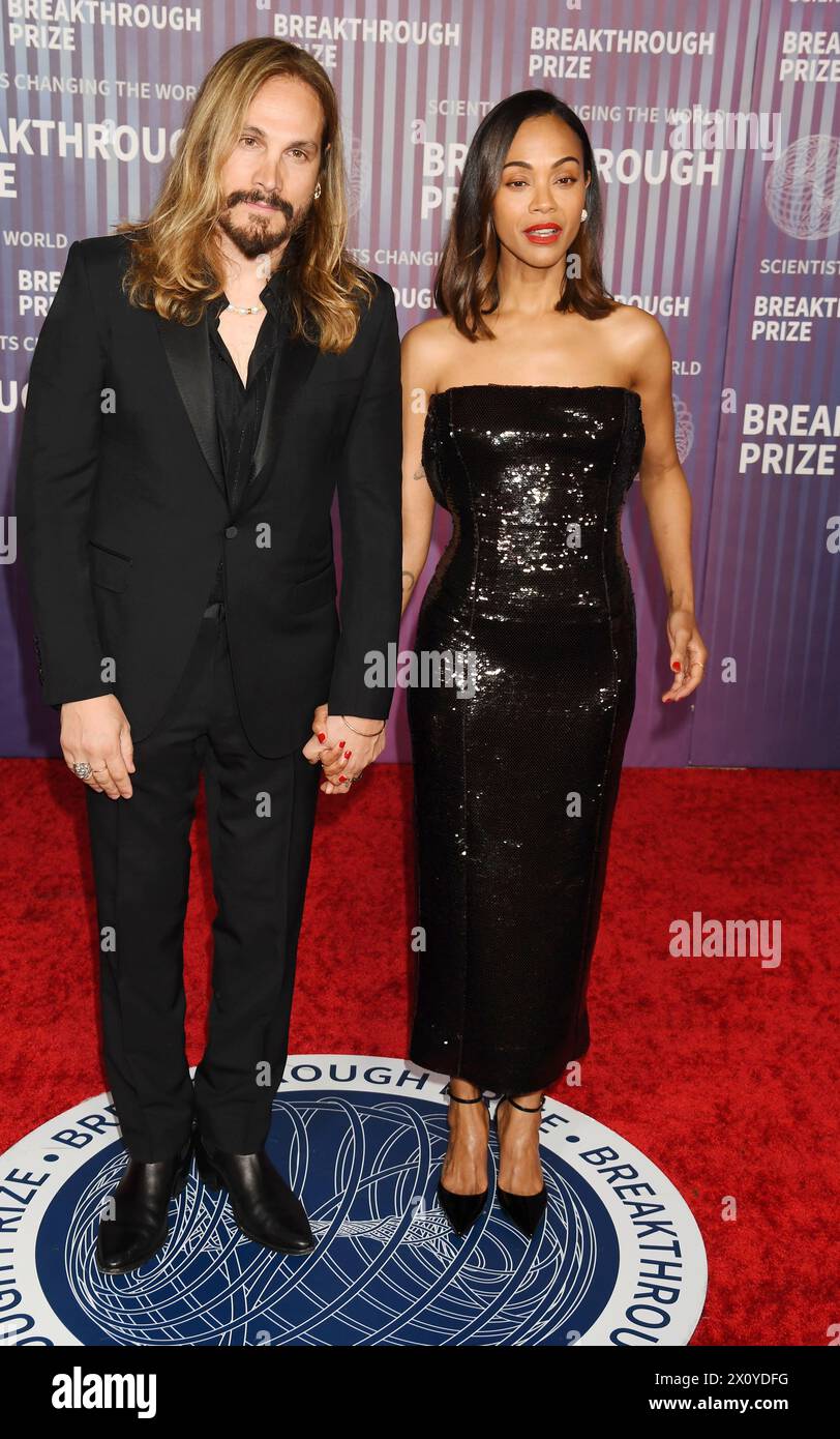 LOS ANGELES, CALIFORNIA - APRIL 13: (L-R) Marco Perego and Zoe Saldana ...
