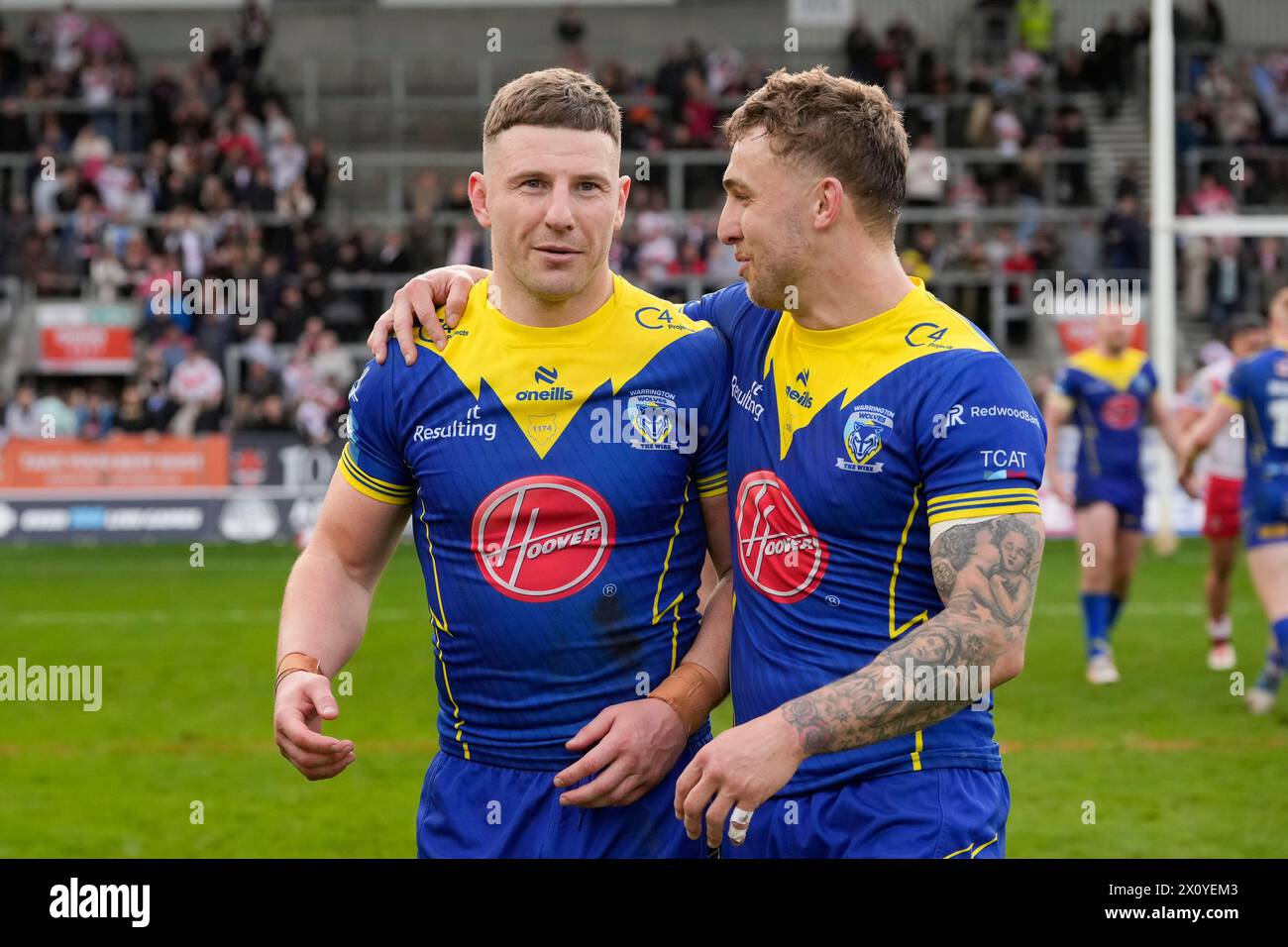 Sam Powell of Warrington Wolves celebrates with man of the match George ...