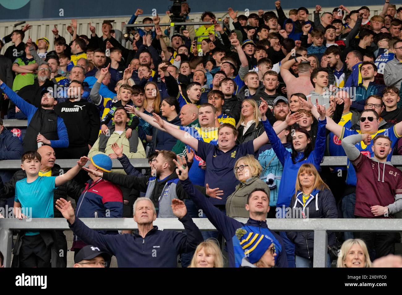 Warrington Wolves fans celebrate their sides 8-31 victory after the ...