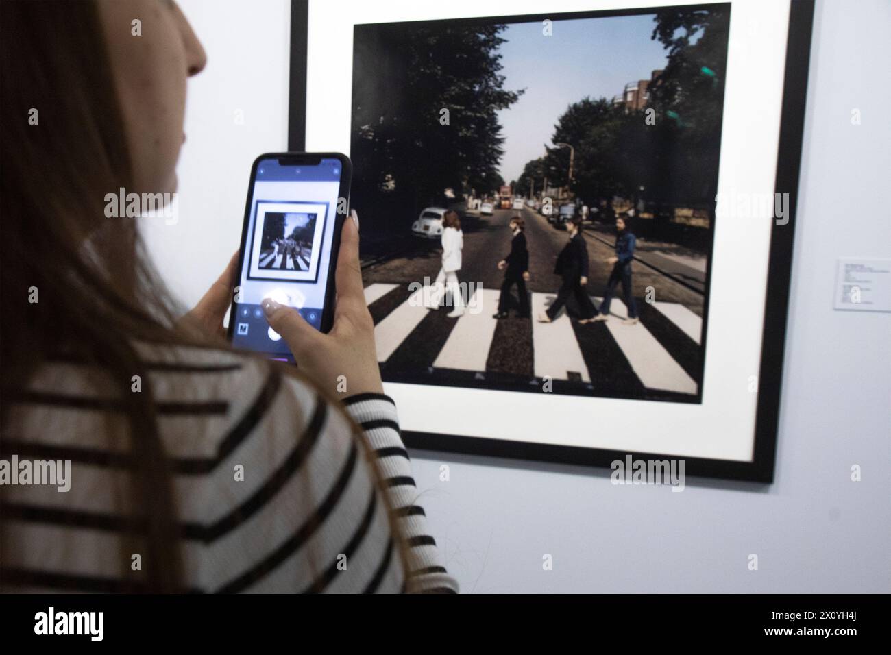 Moscow, Russia. 12th of April, 2024. A woman takes pictures of a ...
