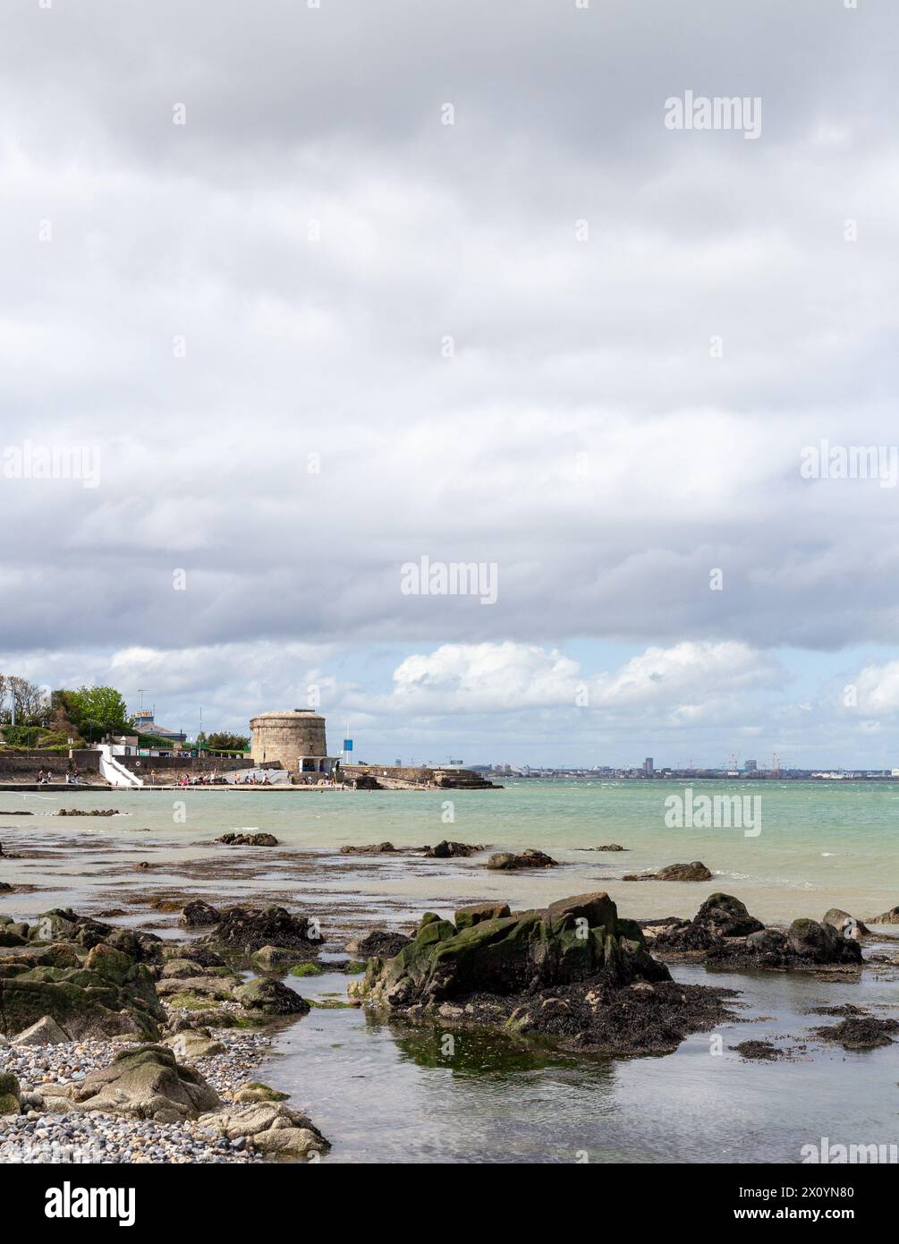 Large rocks and stones in the sea near Seapoint in Ireland. Tere are ...