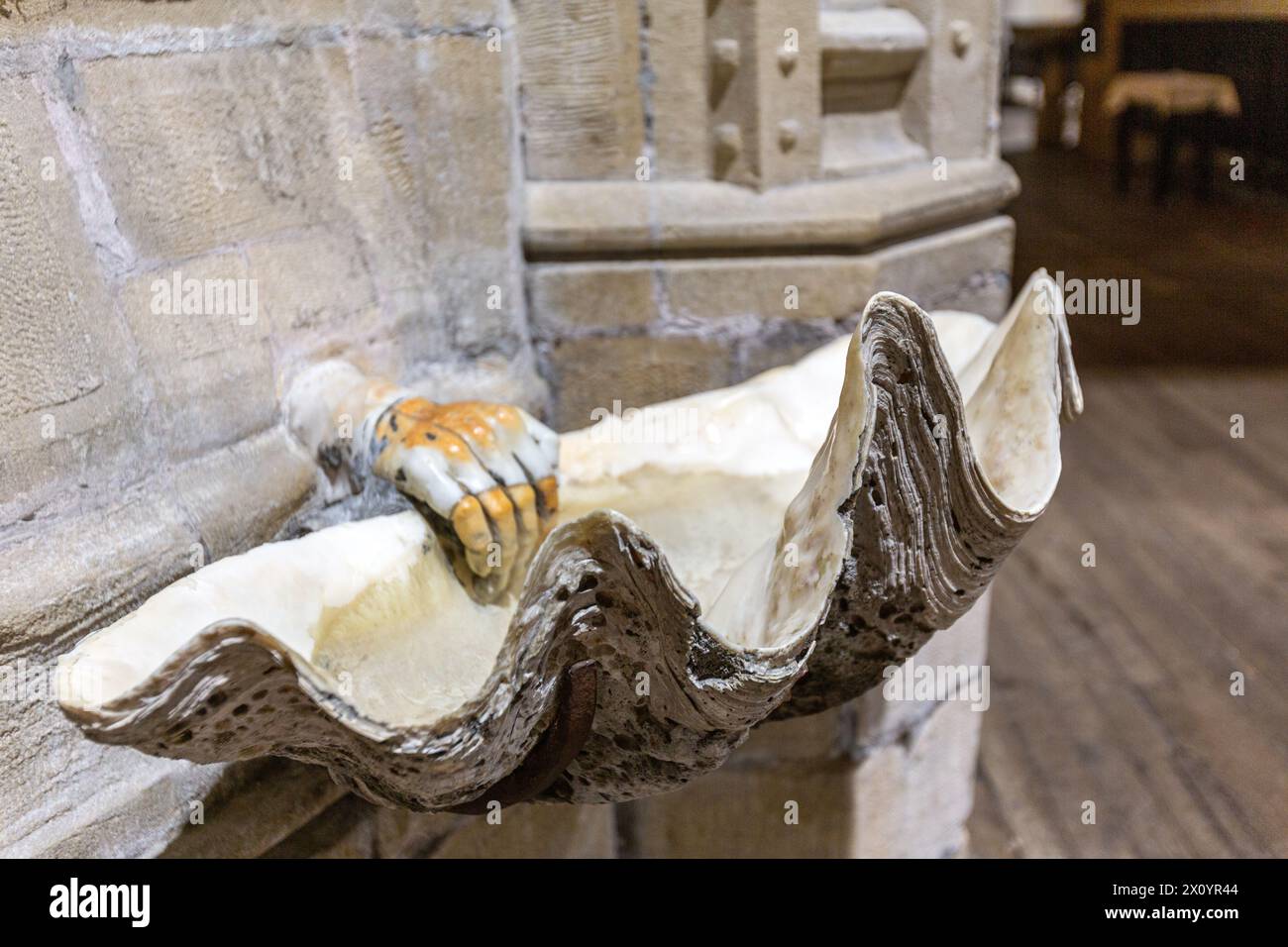 Holy water font in shell shape in Church of Santa María de la Asunción ...