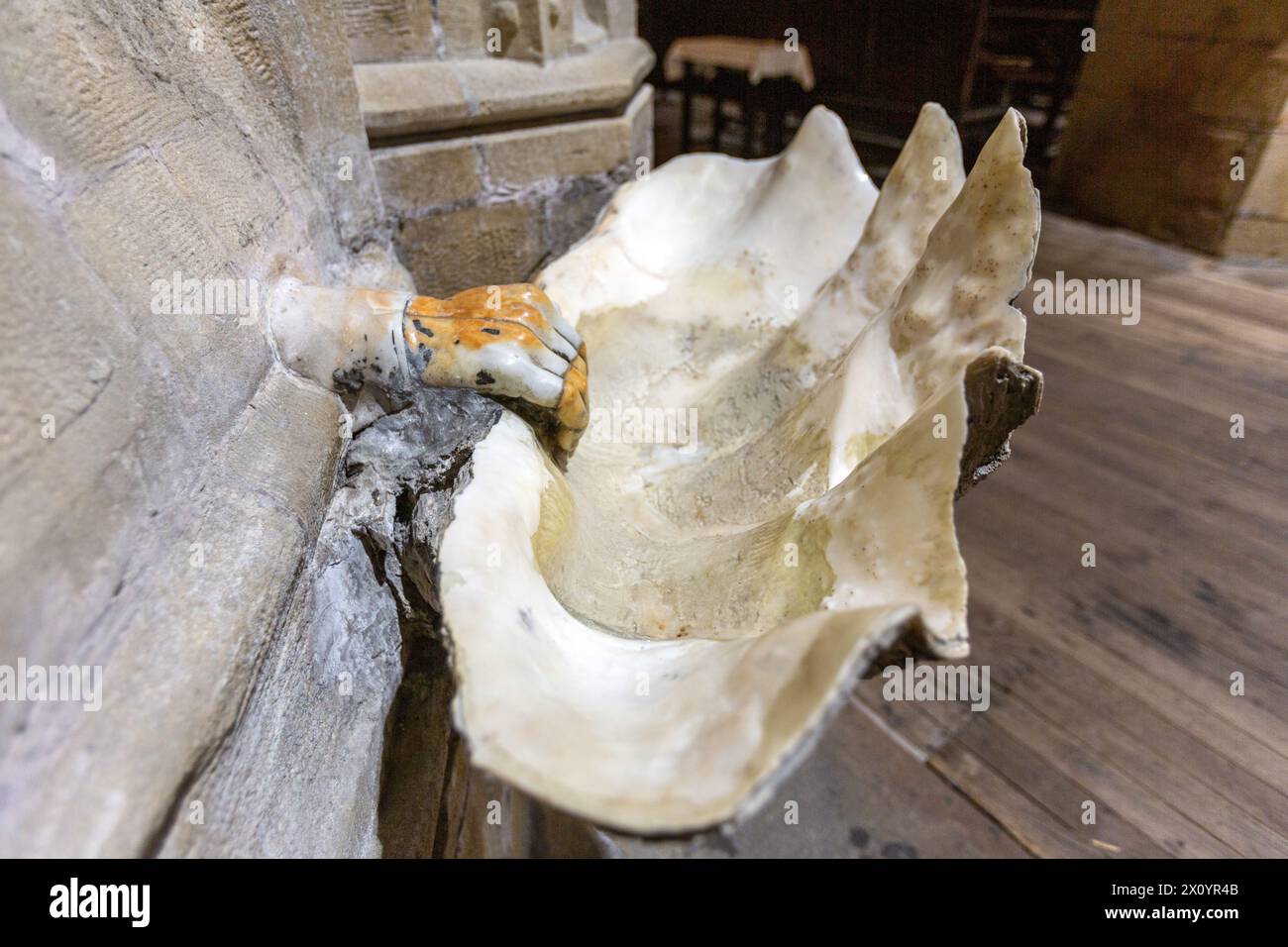 Holy water font in shell shape in Church of Santa María de la Asunción ...