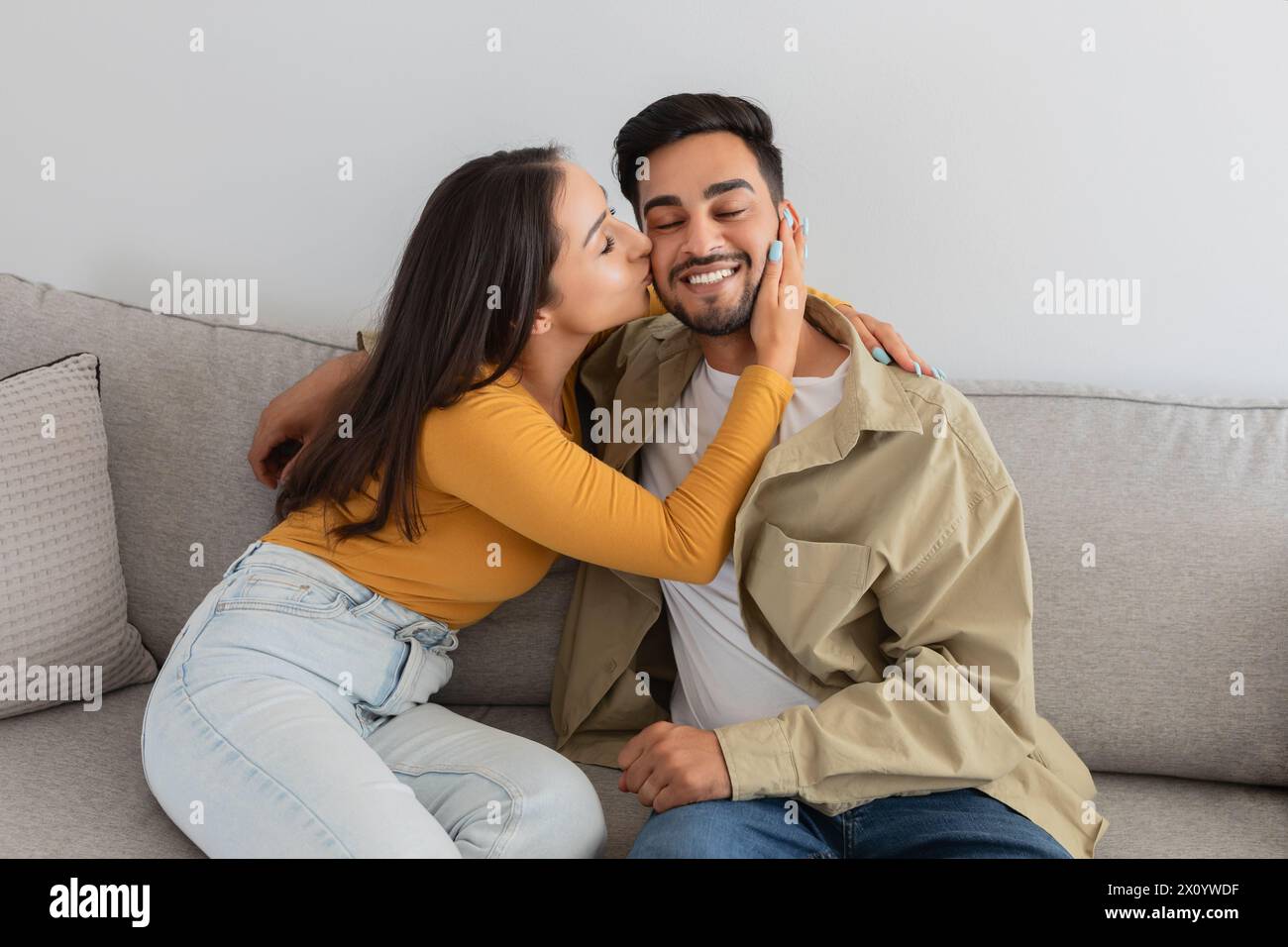 Couple sharing a loving embrace in session Stock Photo - Alamy