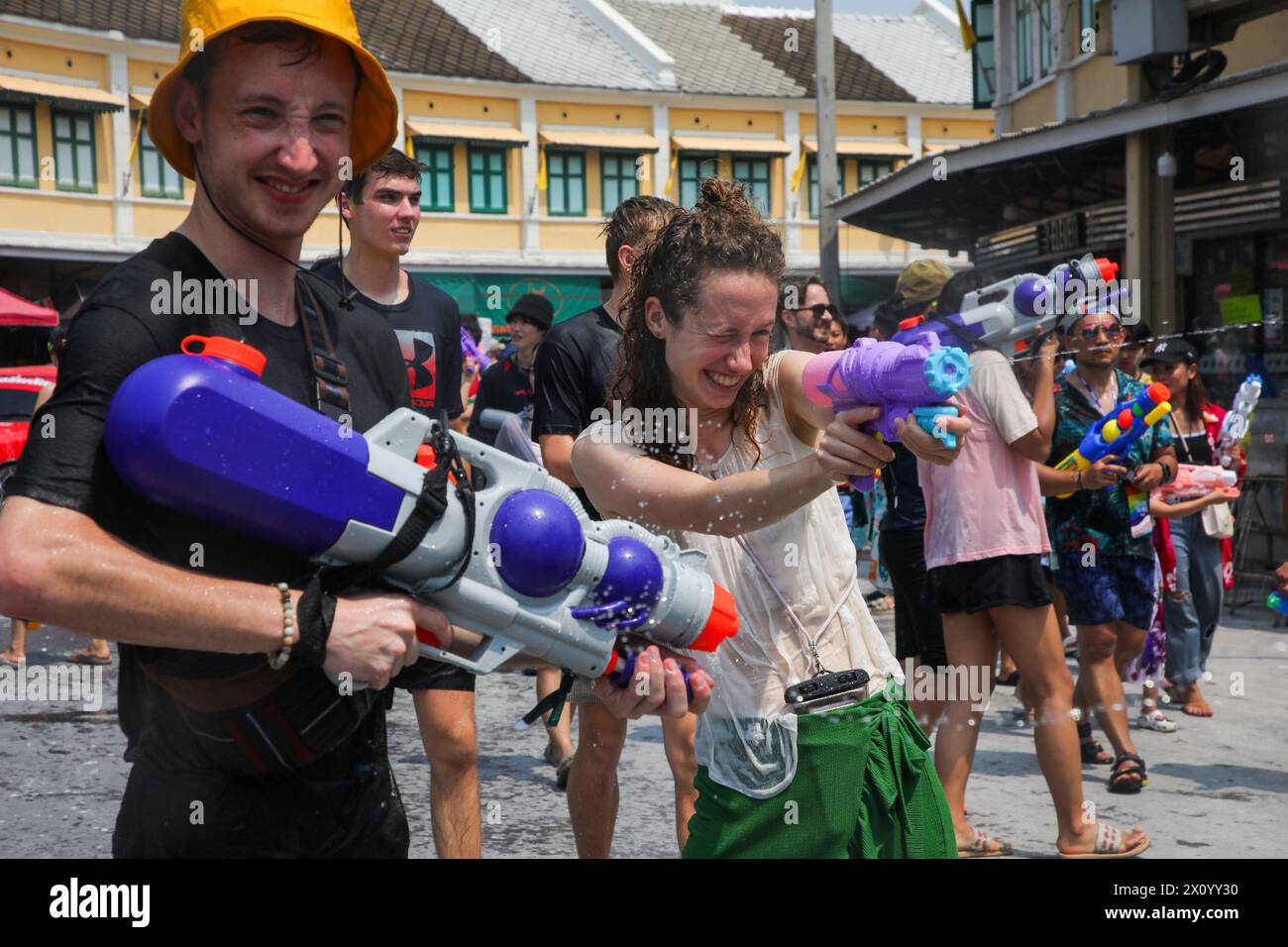 Bangkok, Thailand. 14th Apr, 2024. Tourists play with water guns during ...