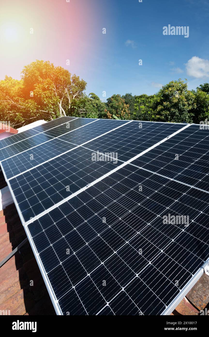 Solar electrical system on house roof top under sun Stock Photo - Alamy