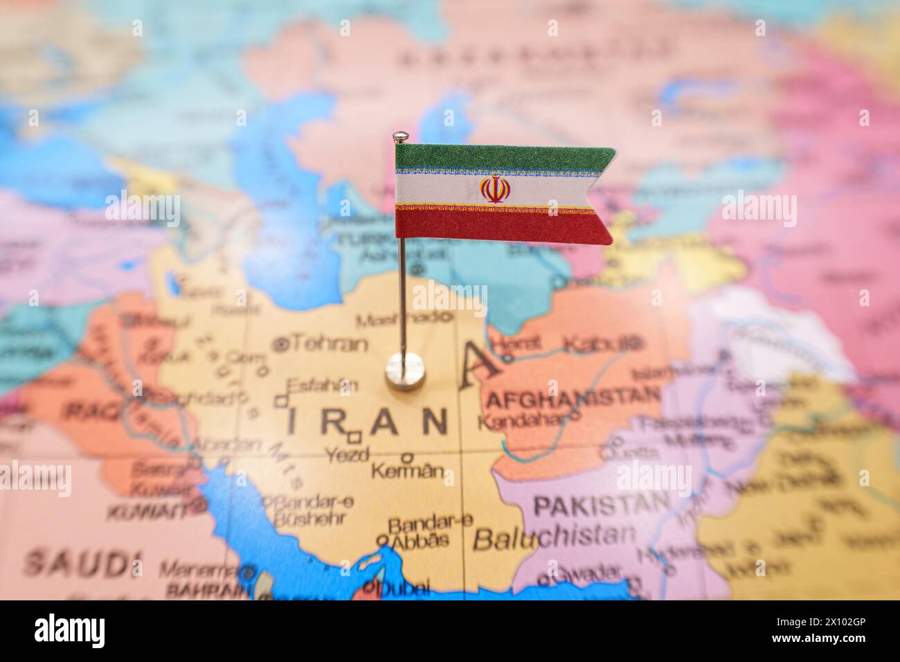 Flag of Islamic republic of Iran on geopolitical map Stock Photo - Alamy