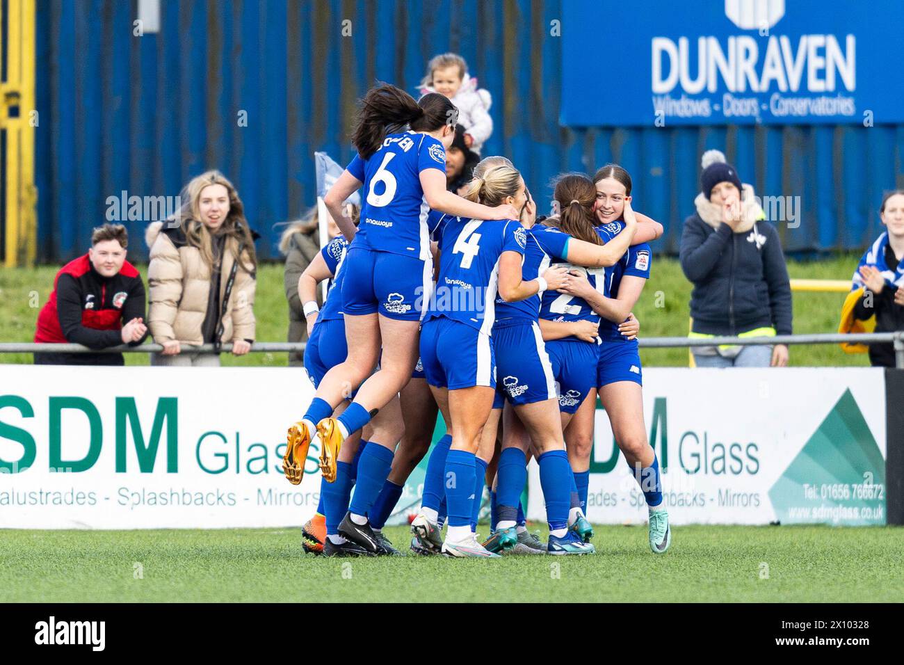 Bridgend, UK. 14th Apr, 2024. Cardiff City celebrate their second goal ...