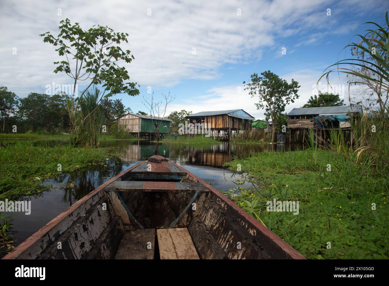Huts on stilts where the Itaya River meets the Amazon river outside of ...