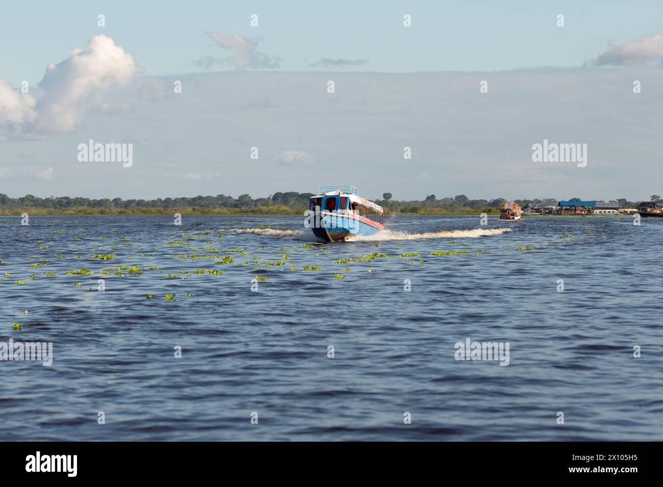 A boat ride to where the Itaya River meets the Amazon river outside of ...