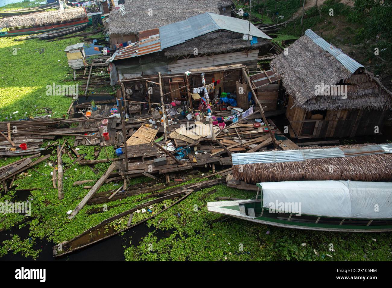 Huts on stilts where the Itaya River meets the Amazon river outside of ...