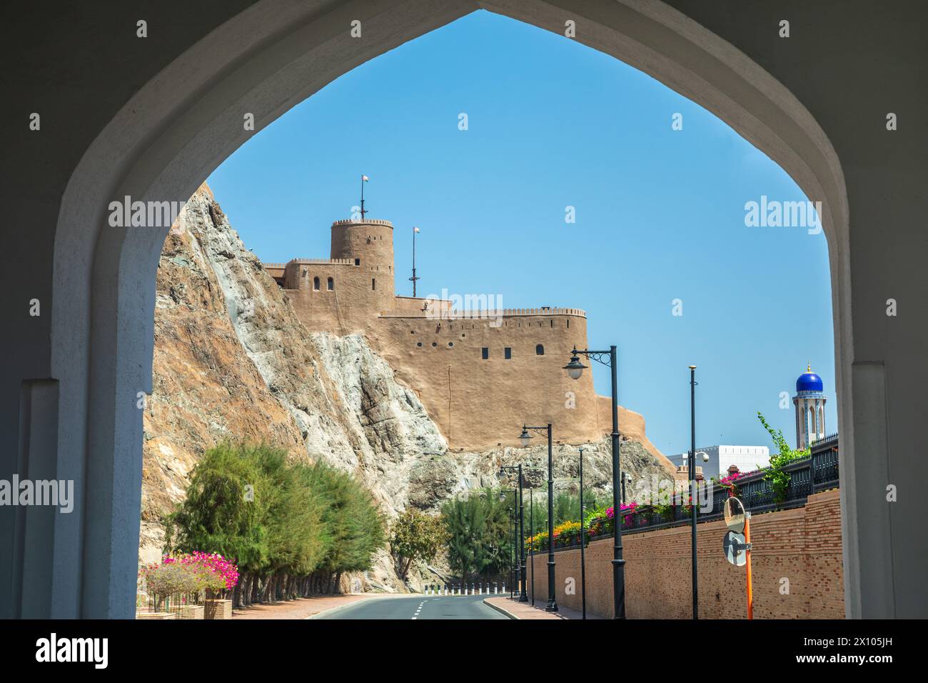 View from the arch to the Al Mirani castle on the rock standing on the ...