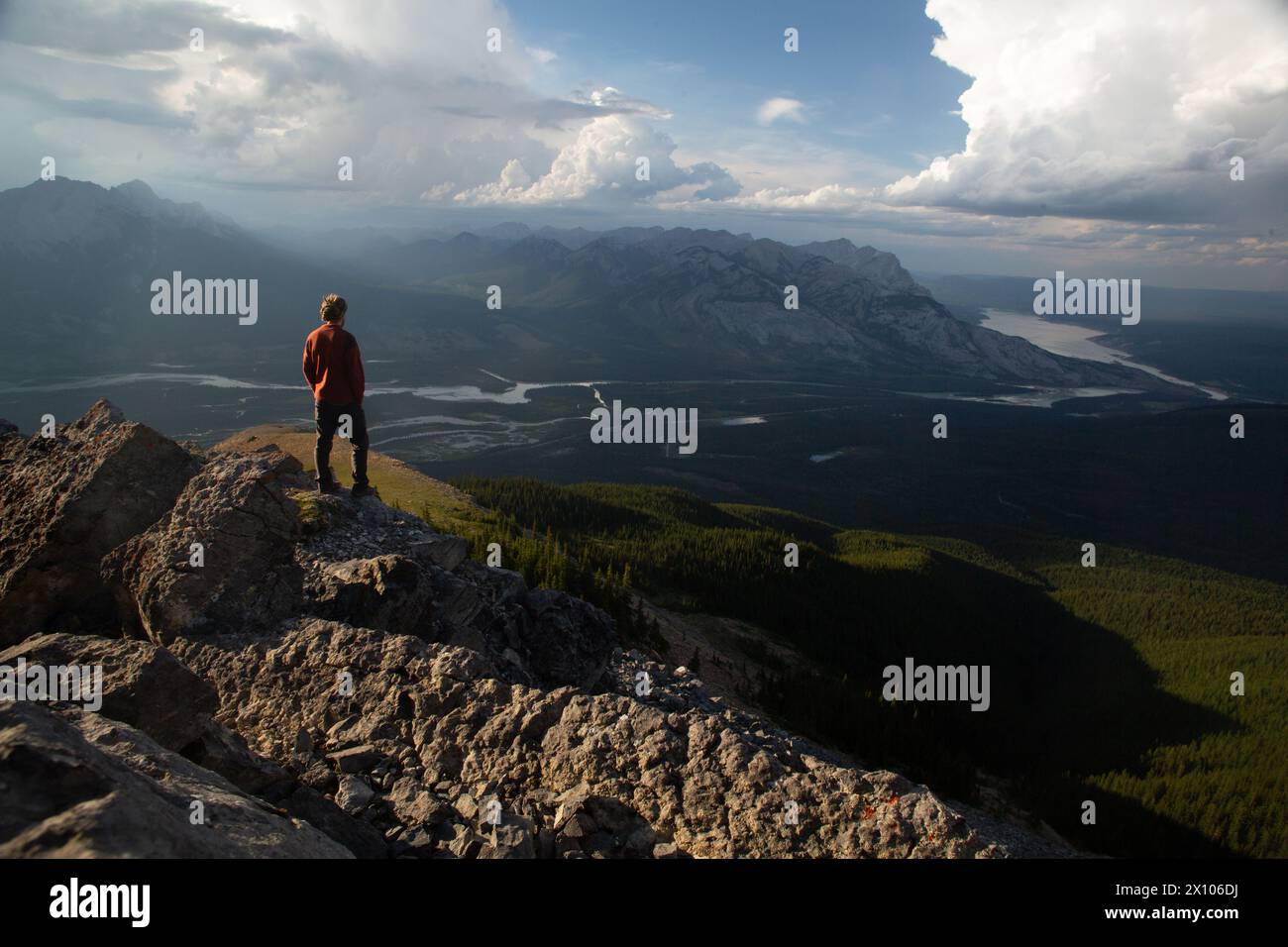 Hikers scale the ridge of Roche Miette in Jasper National Park. Brule ...
