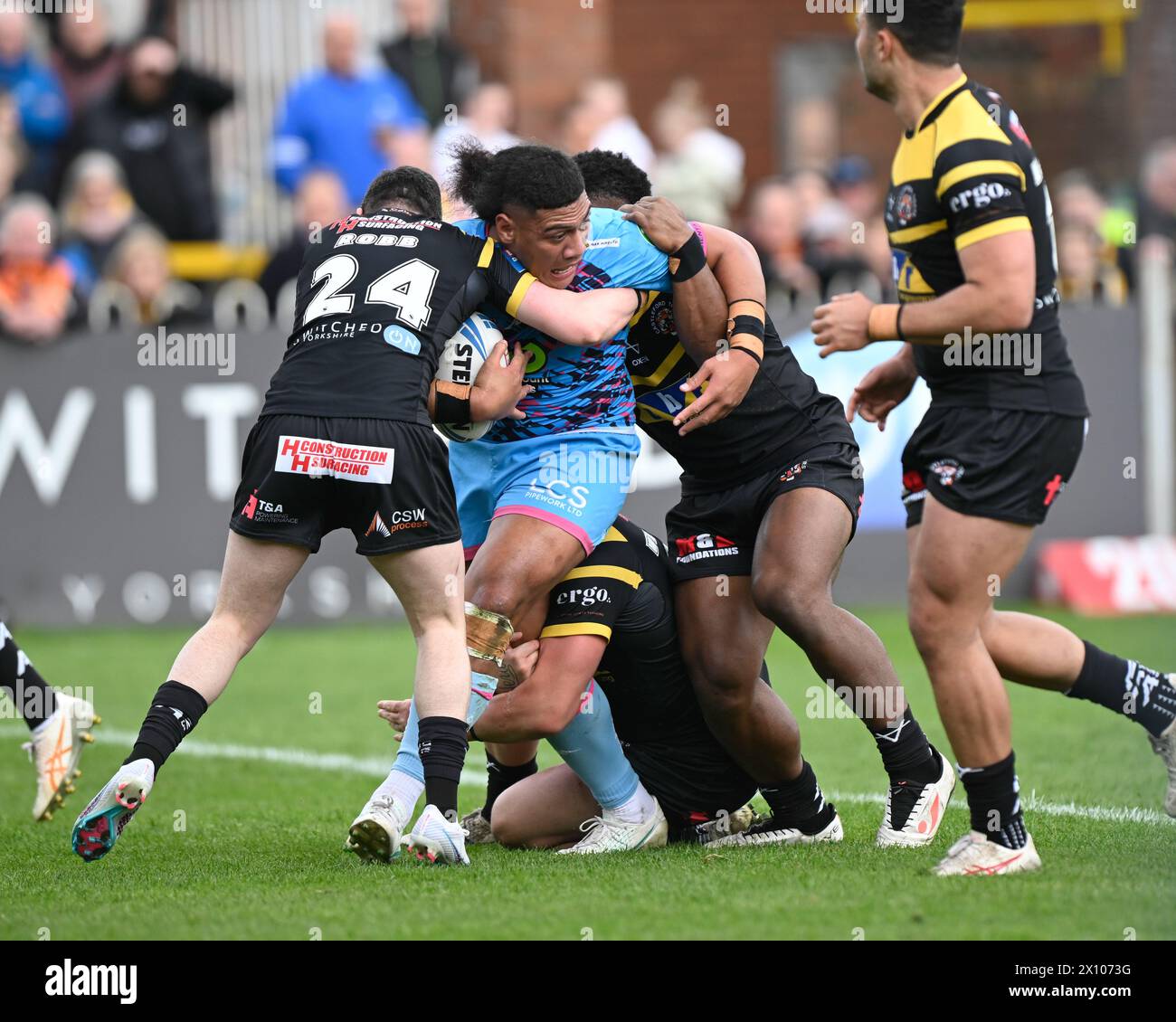 Tyler Dupree of Wigan Warriors is tackled during the Betfred Challenge ...