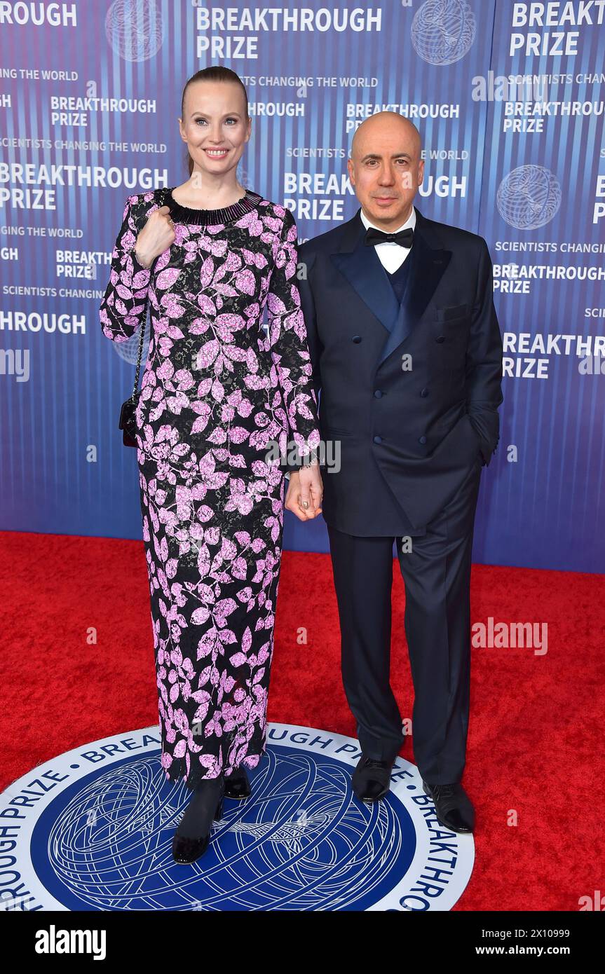Julia Milner, left, and Yuri Milner arrive at the 10th Breakthrough Prize Ceremony on Saturday ...