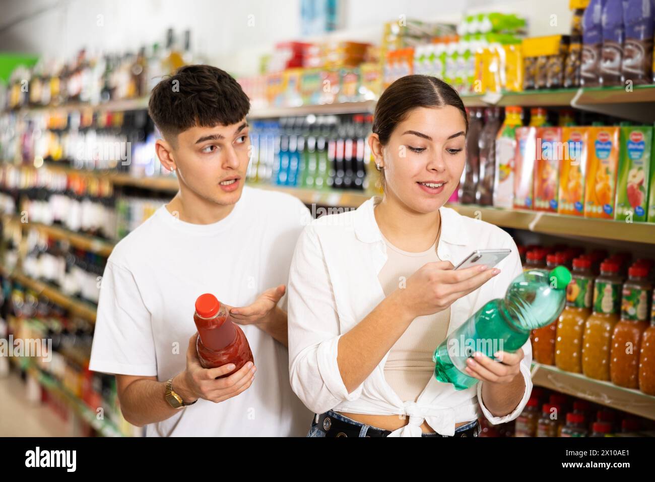 Fizzy drinks woman shop hi-res stock photography and images - Alamy