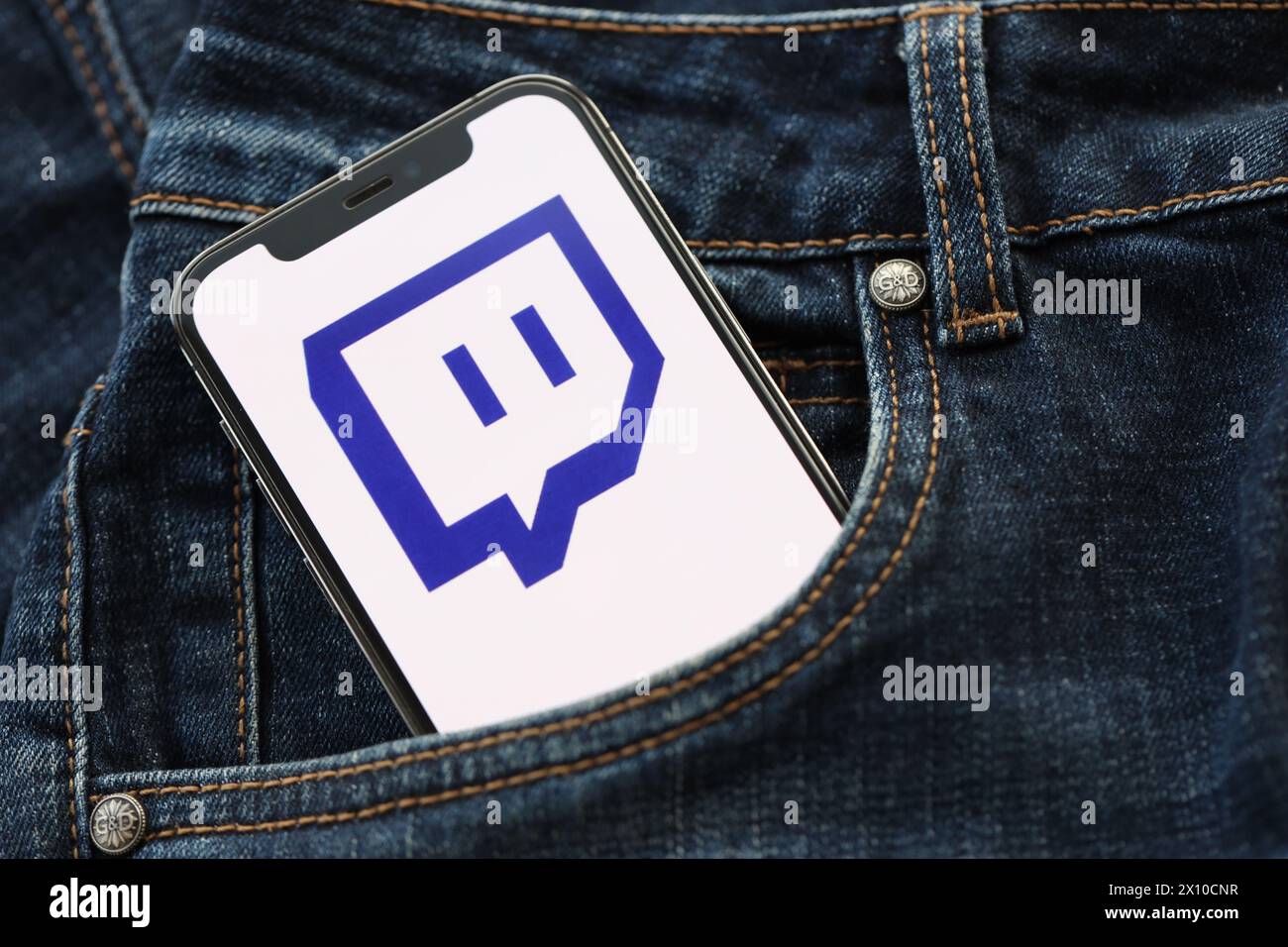 KYIV, UKRAINE - APRIL 1, 2024 Twitch icon on smartphone display screen ...
