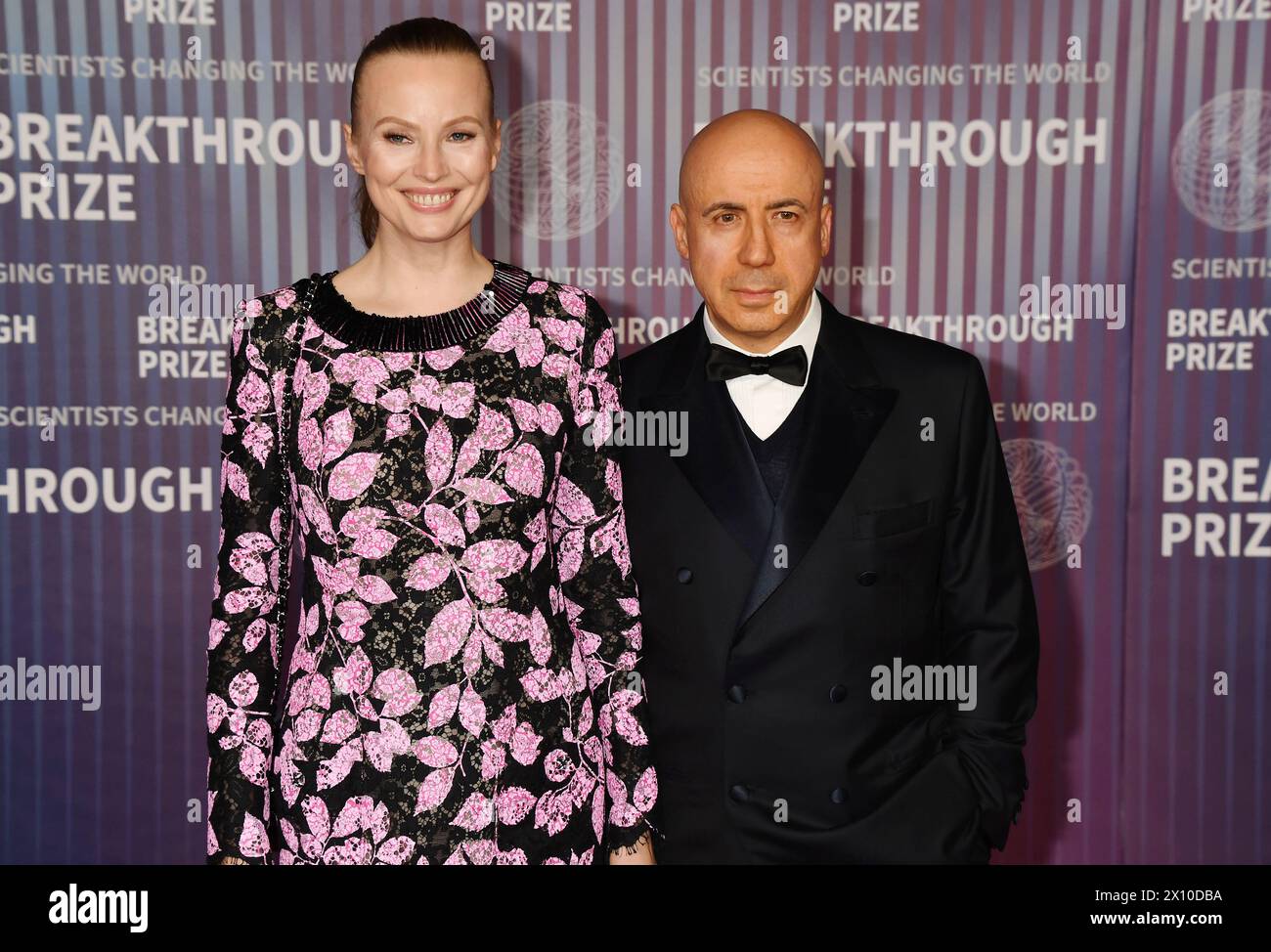 LOS ANGELES, CALIFORNIA - APRIL 13: (L-R) Julia Milner and Yuri Milner ... LOS ANGELES, CALIFORNIA - APRIL 13: (L-R) Julia Milner and Yuri Milner ...