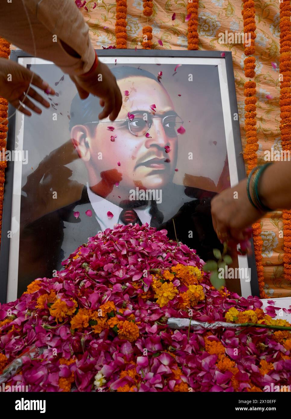 NOIDA, INDIA - APRIL 14: People offer floral tributes on the occasion ...