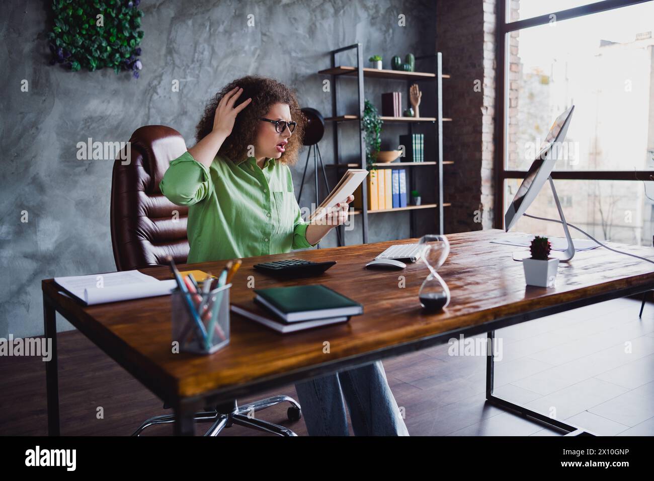 Photo of shocked confused woman reading report mistake problem modern ...