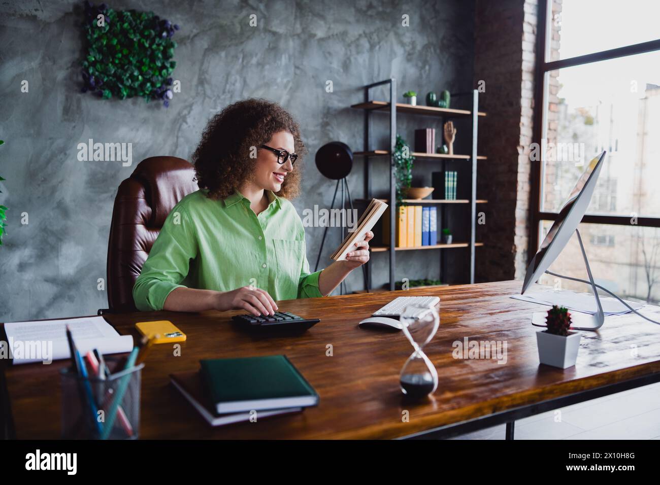 Photo of charming successful woman checking financial statistics ...