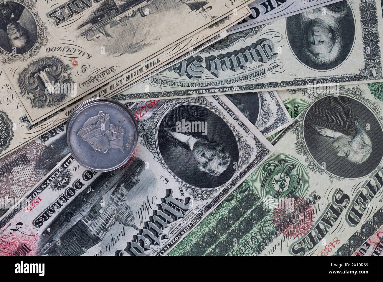 Old west period US banknotes and silver certificates with silver dollar ...