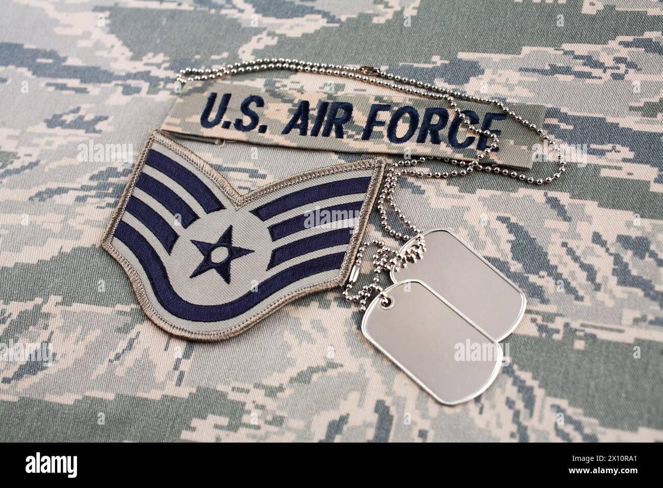 US AIR FORCE branch tape and Staff Sergeant rank patch and dog tags on ...