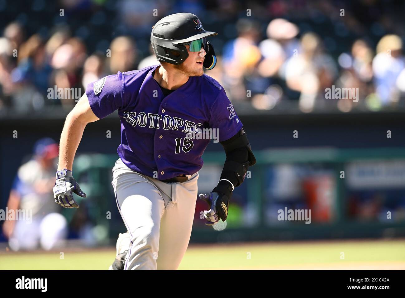 Hunter Goodman (15) of the Albuquerque Isotopes runs to first base ...
