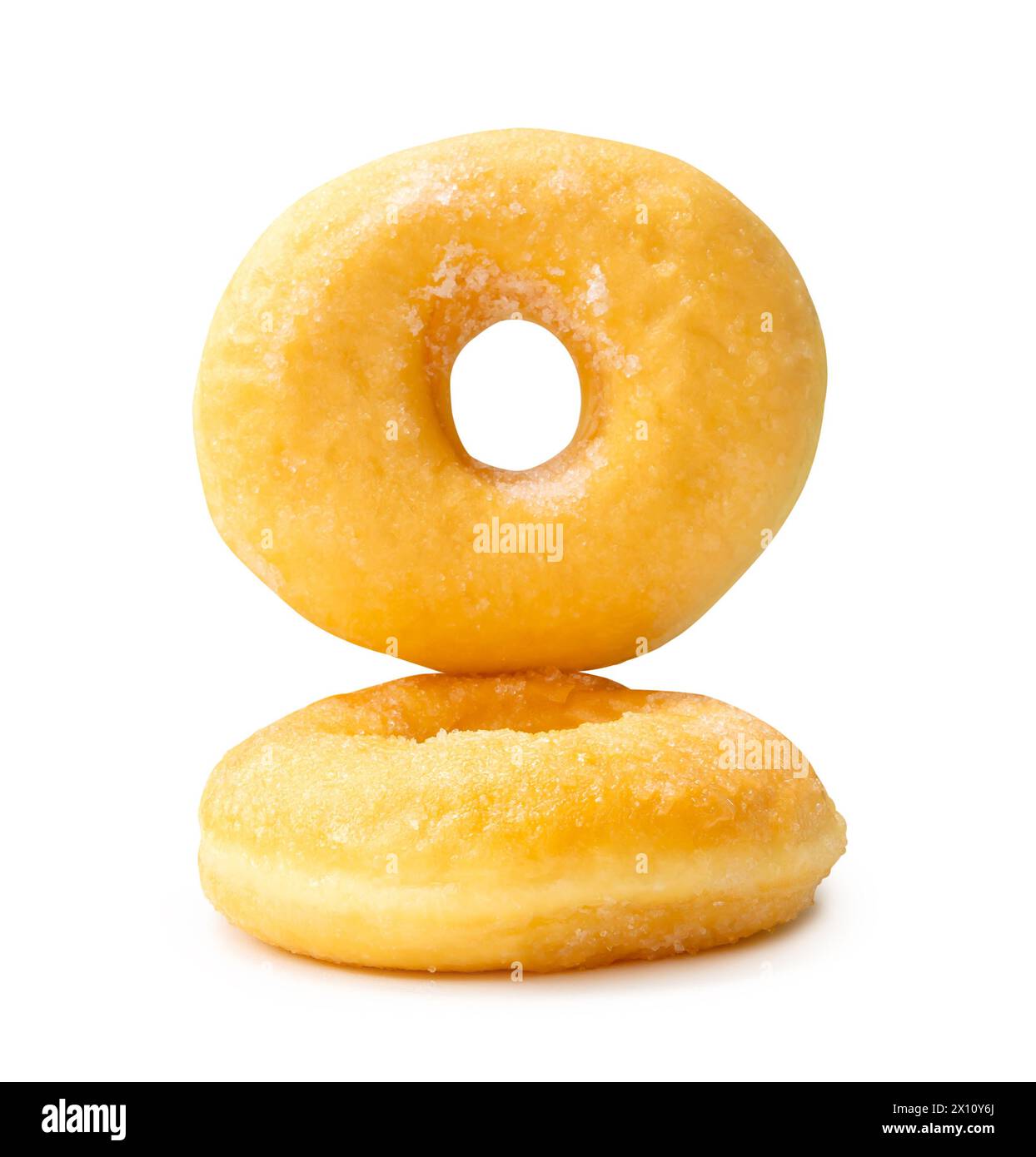 Front view of two sugar glazed cinnamon donuts in stack is isolated on ...