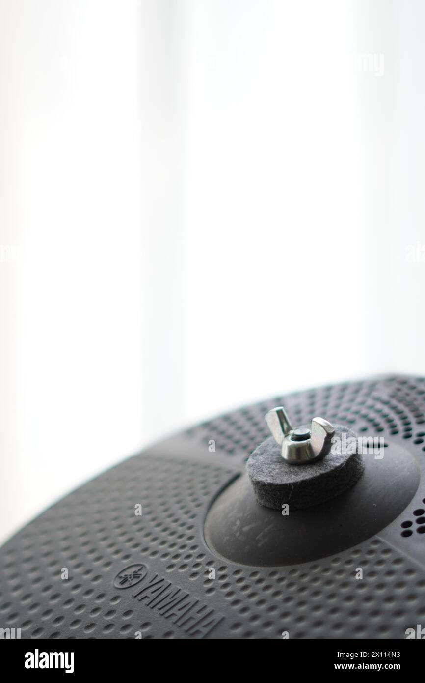 Cymbal from the Yamaha drum dtx series with a blurred white background ...