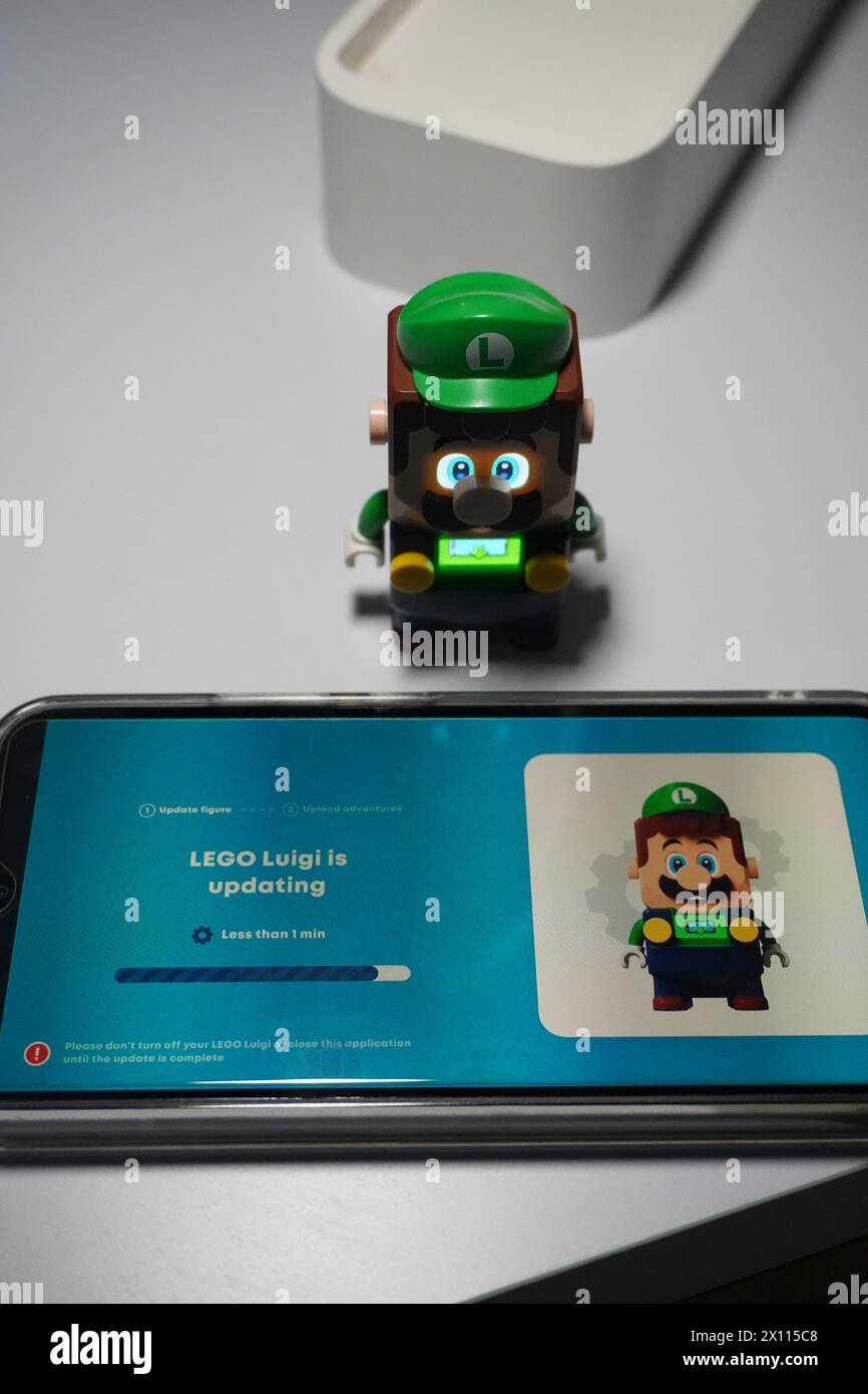 A figure of Luigi from the Super Mario Bros cartoon that lights up and ...