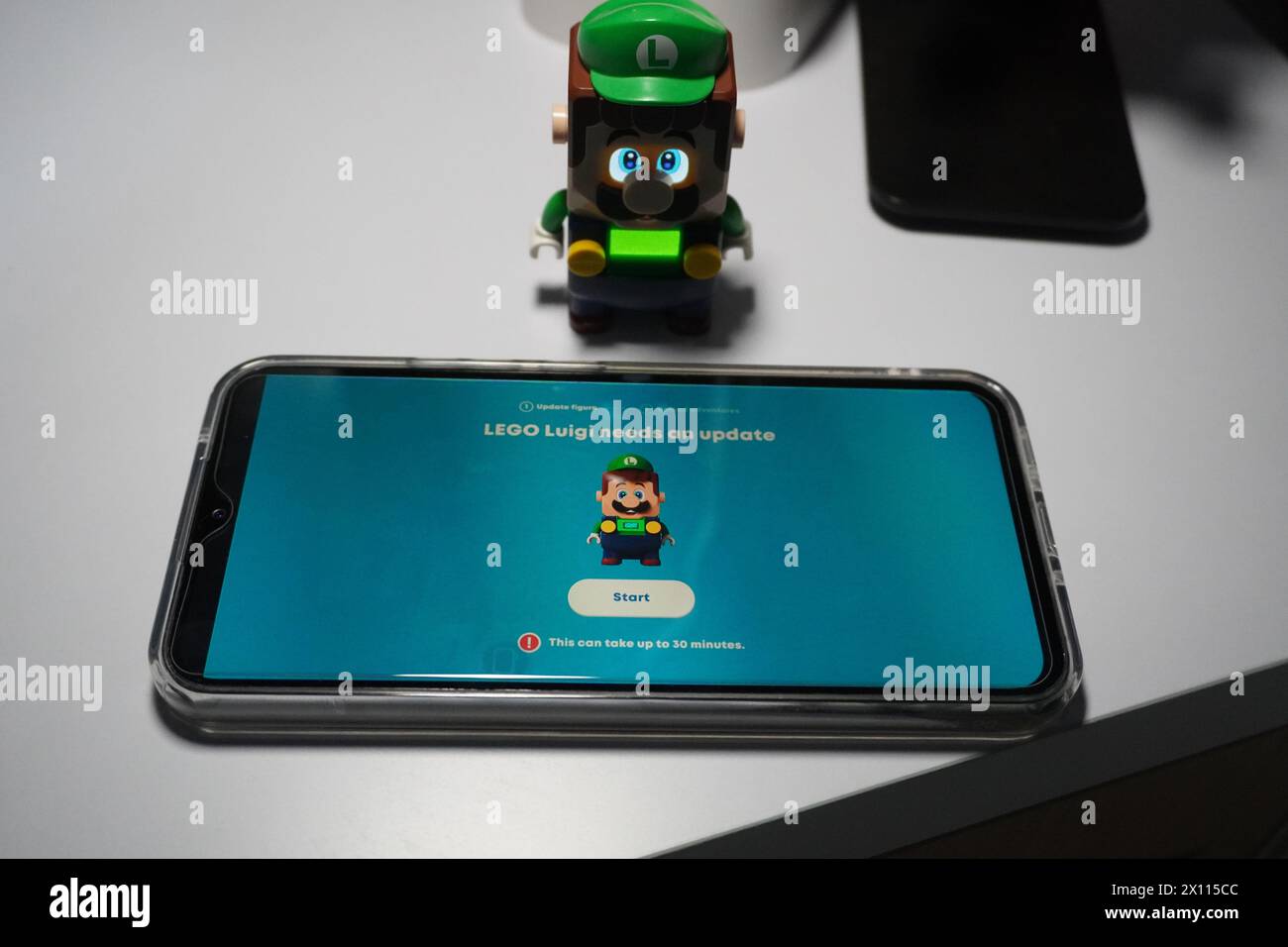 A figure of Luigi from the Super Mario Bros cartoon that lights up and ...