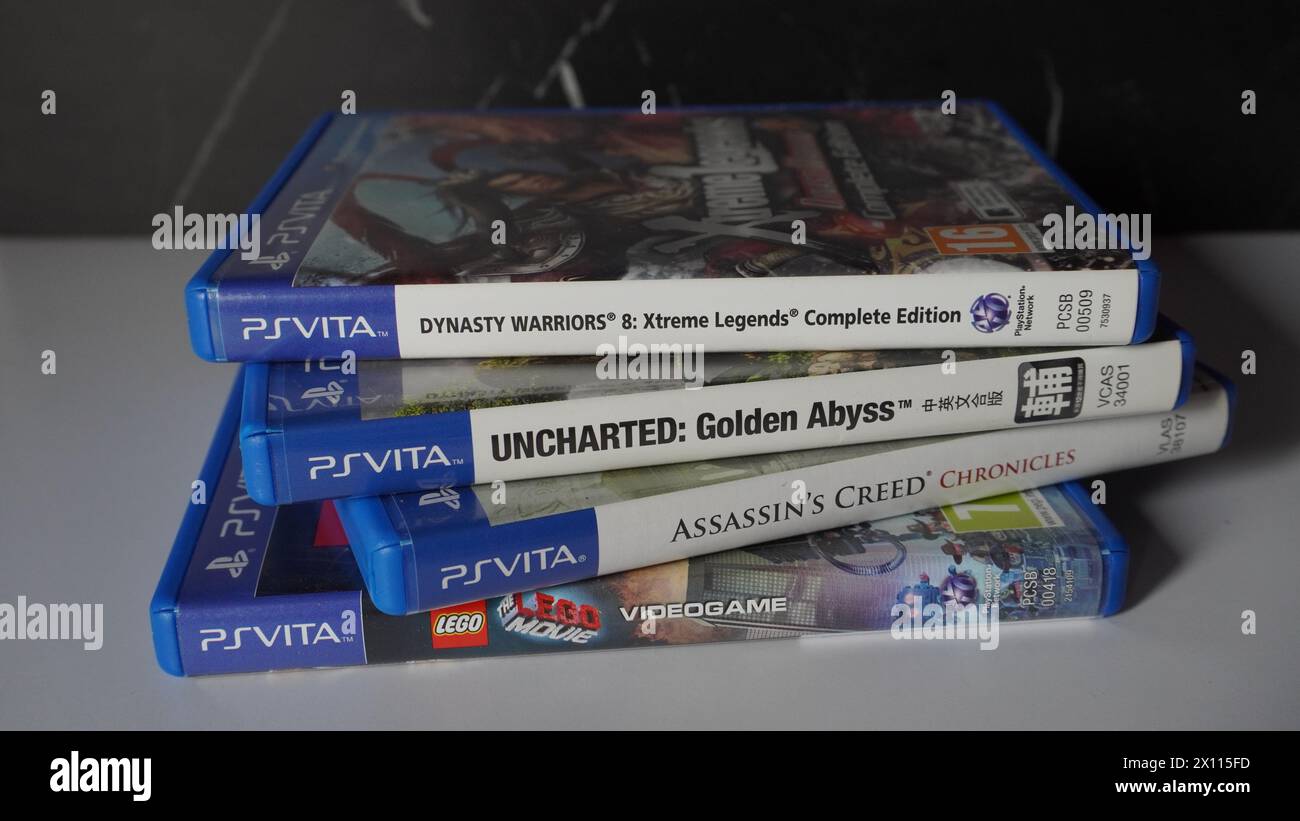 Randomly arranged pile of four PS Vita games Stock Photo - Alamy