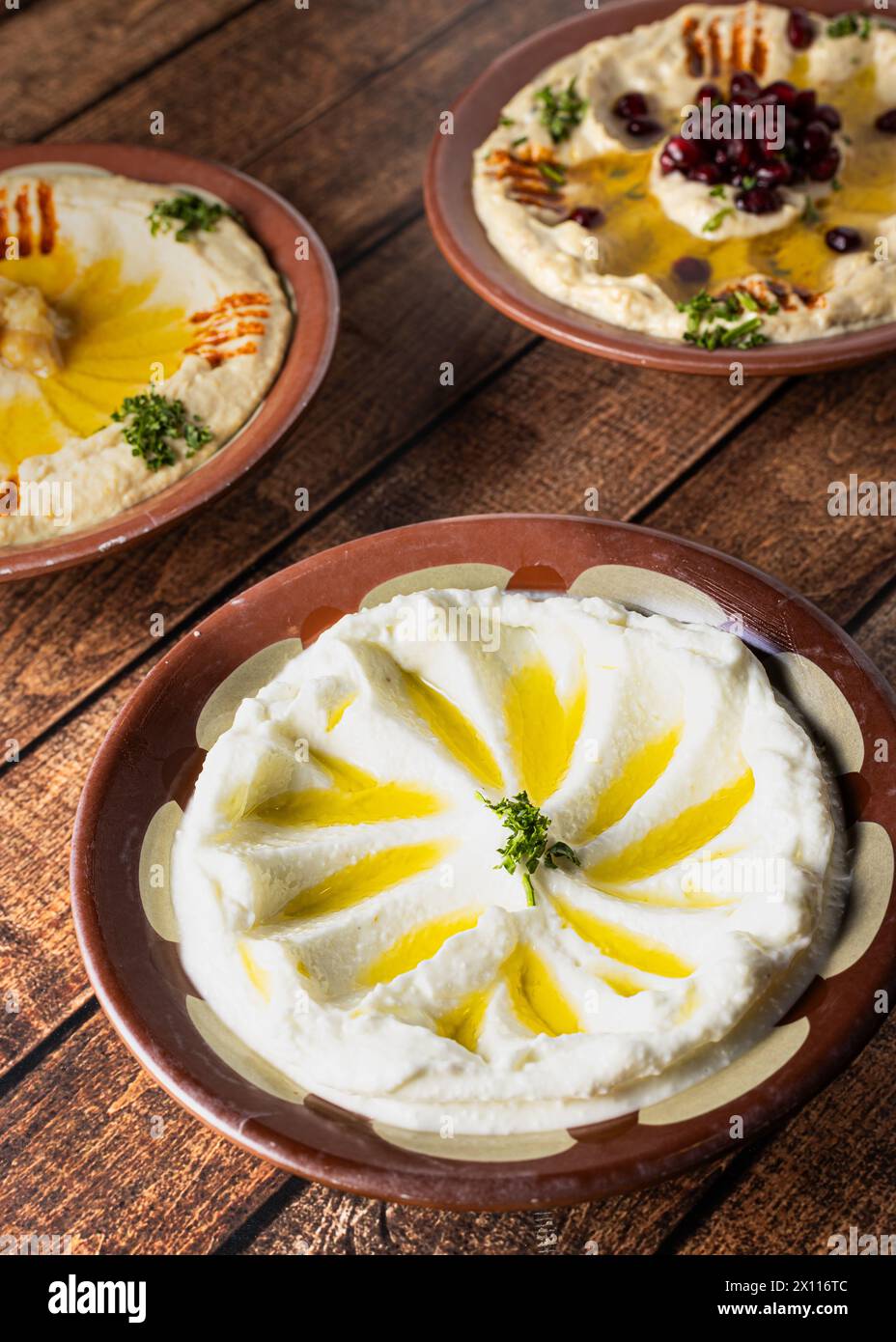 arab food, humus, yogurt, tabbouleh Stock Photo - Alamy