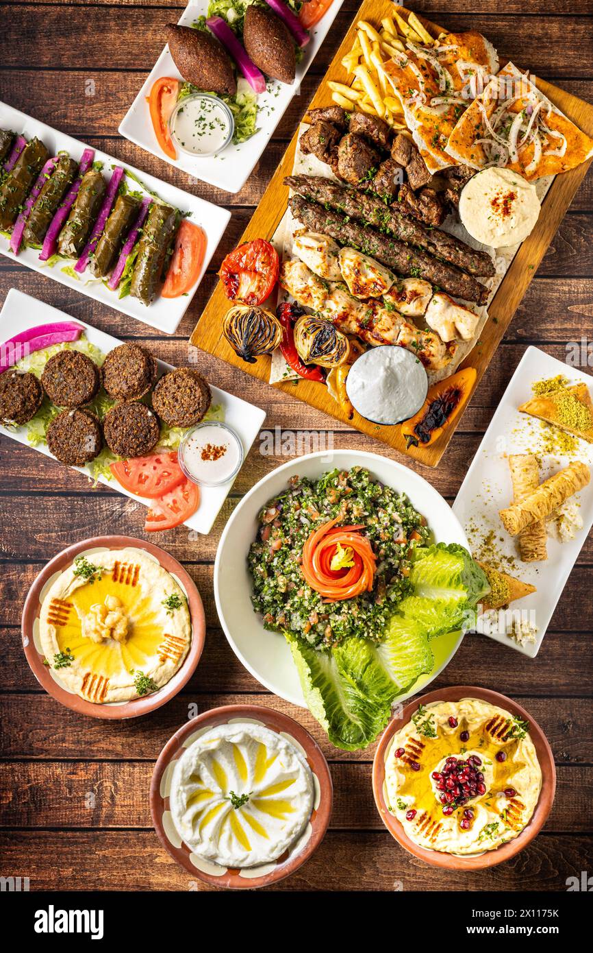 mediterranean arab dishes from top view on a wood table tabouleh ...