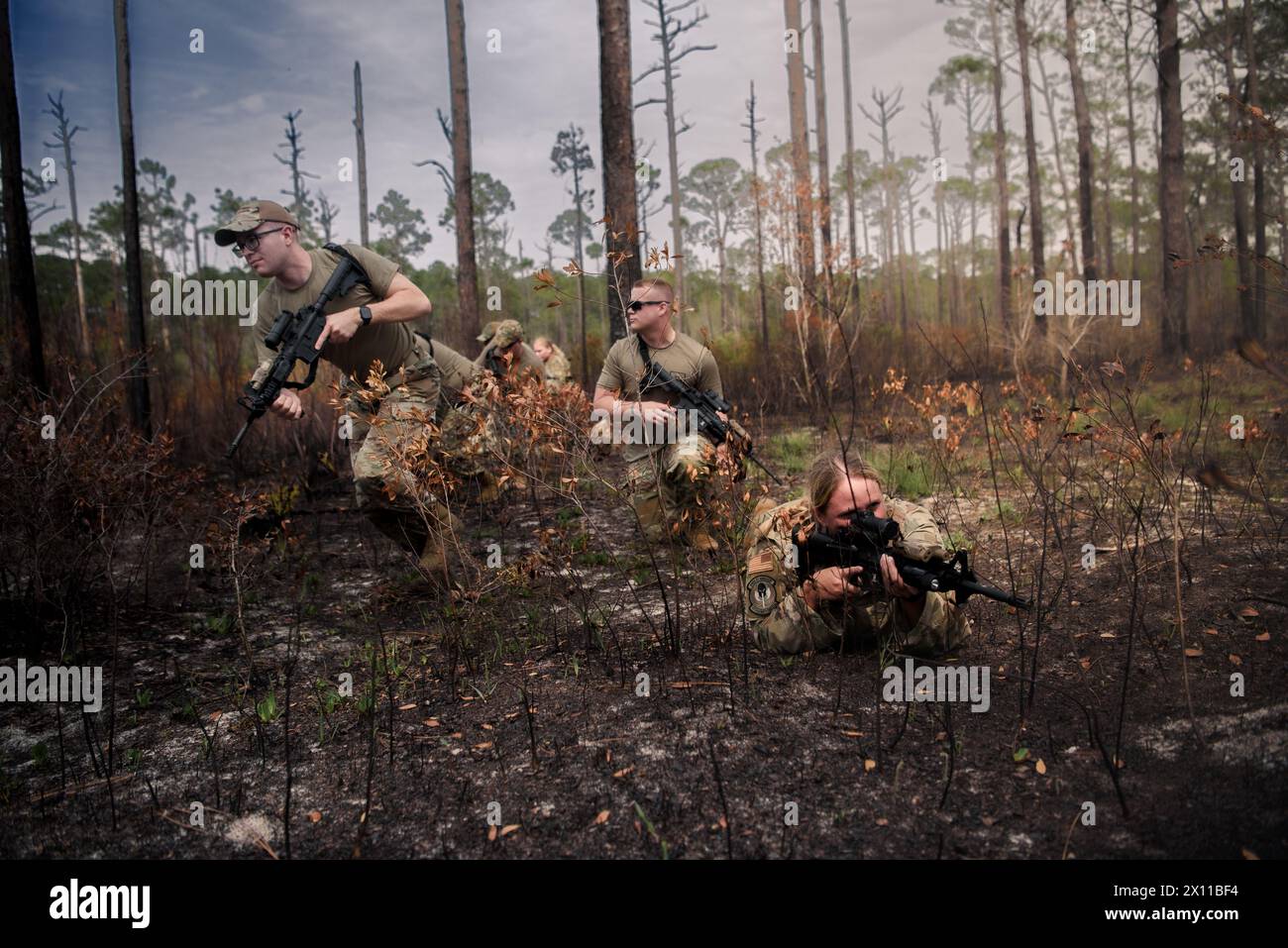 Members of the 110th Security Forces Squadron practice patrols and ...