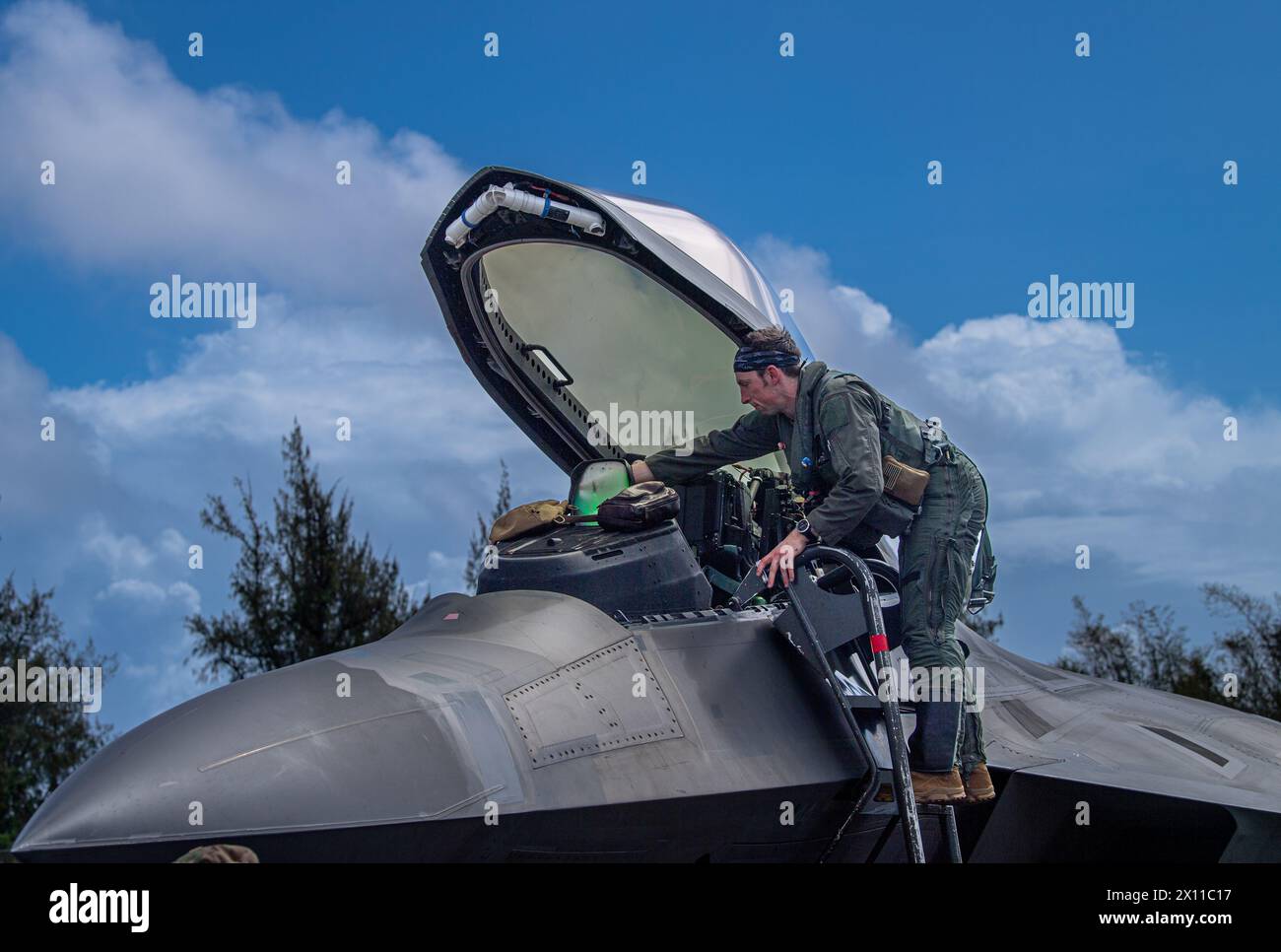 An F-22 Raptor pilot assigned to the 90th Expeditionary Fighter ...